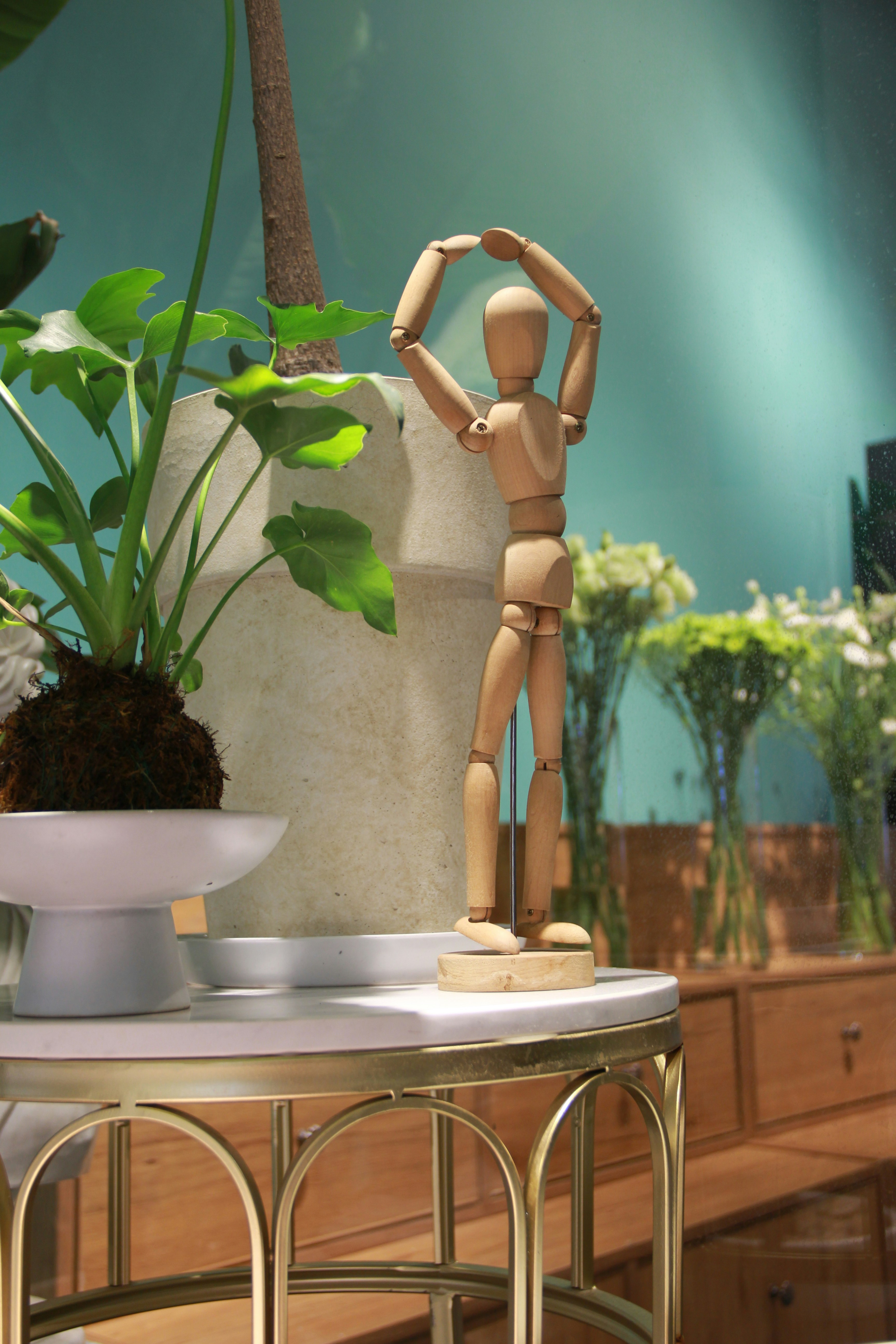 Wooden Figure Reveals a Quiet Studio Gesture