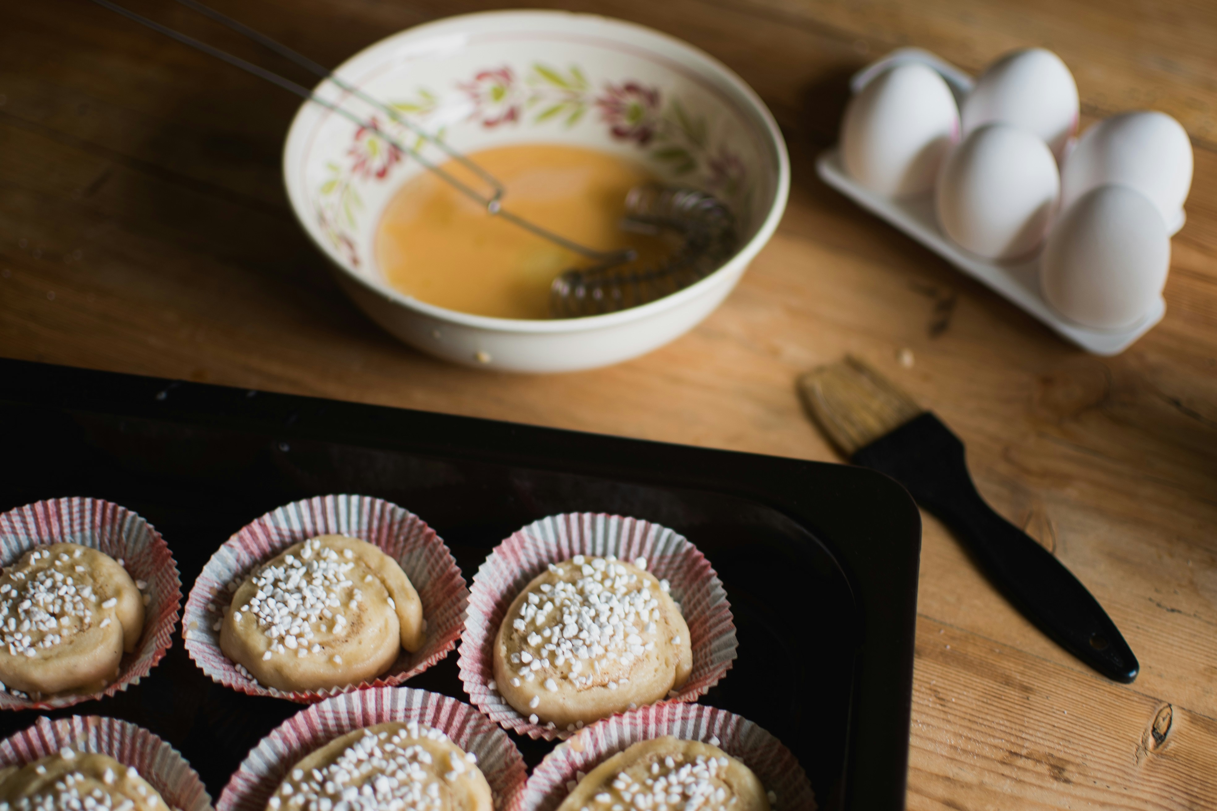 Golden Muffins on a Tray: A Warm Moment in the Baking Studio