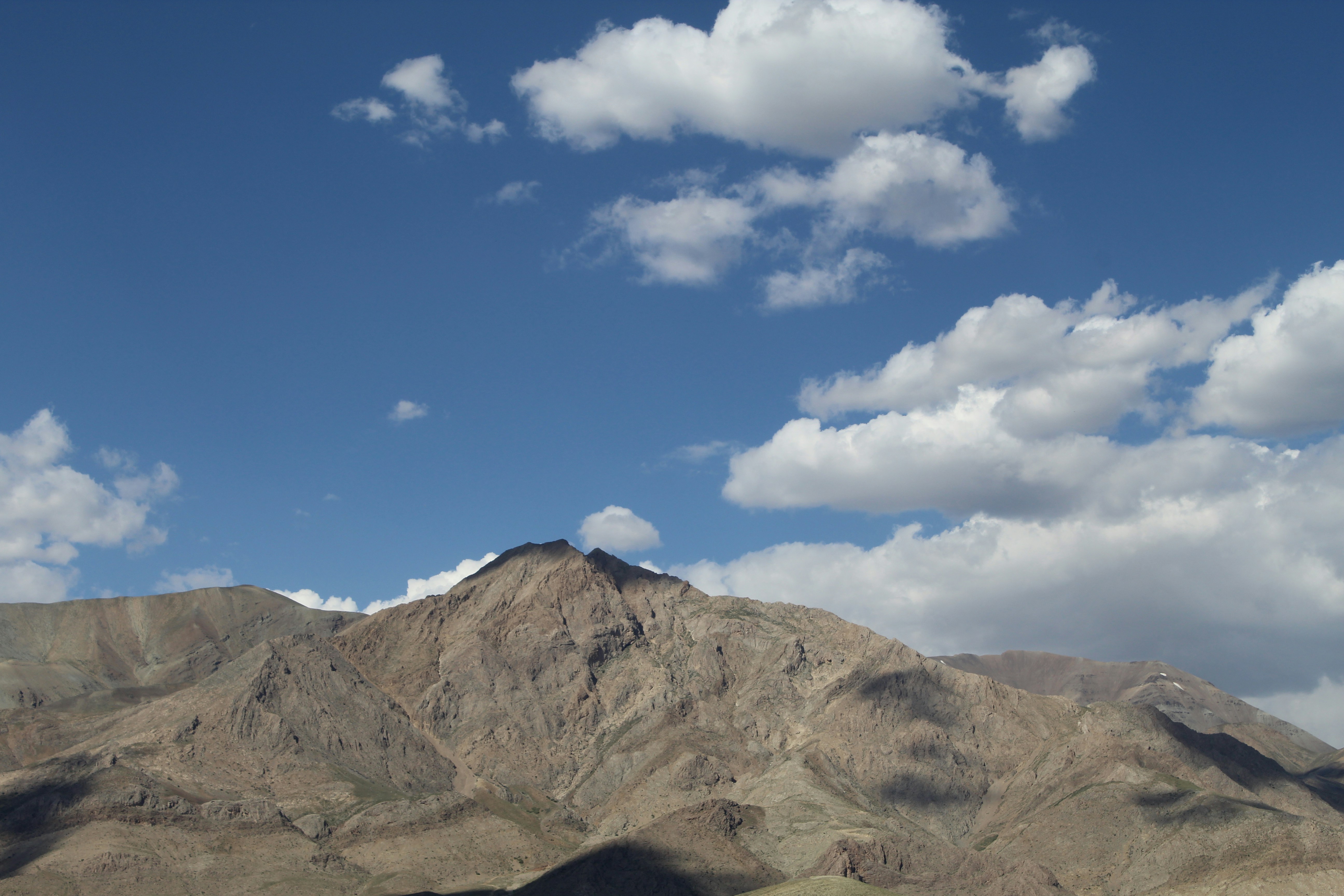 Brown and gray mountain under blue sky during daytime photo – Free ...
