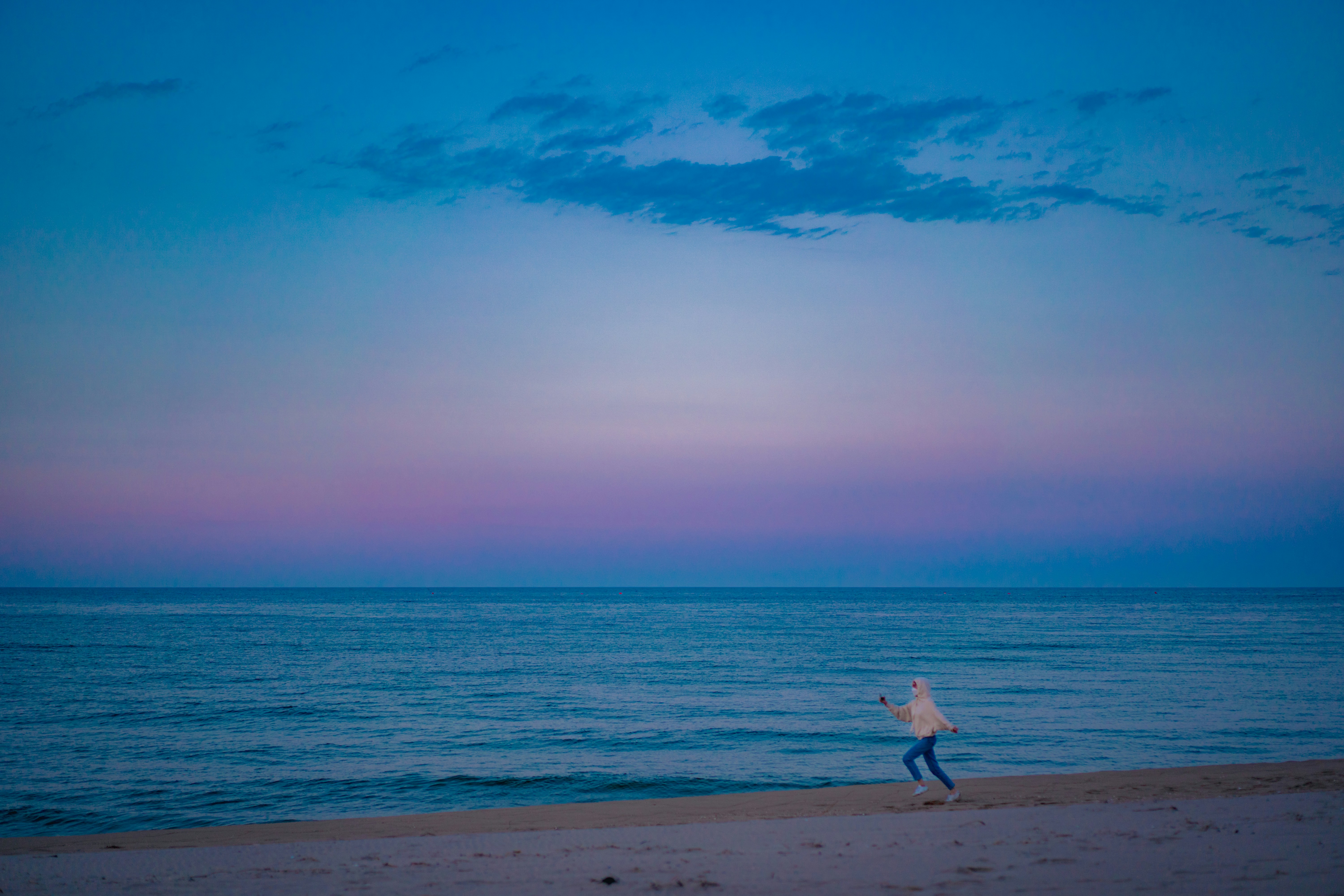Twilight Dash Along a Quiet Seashore