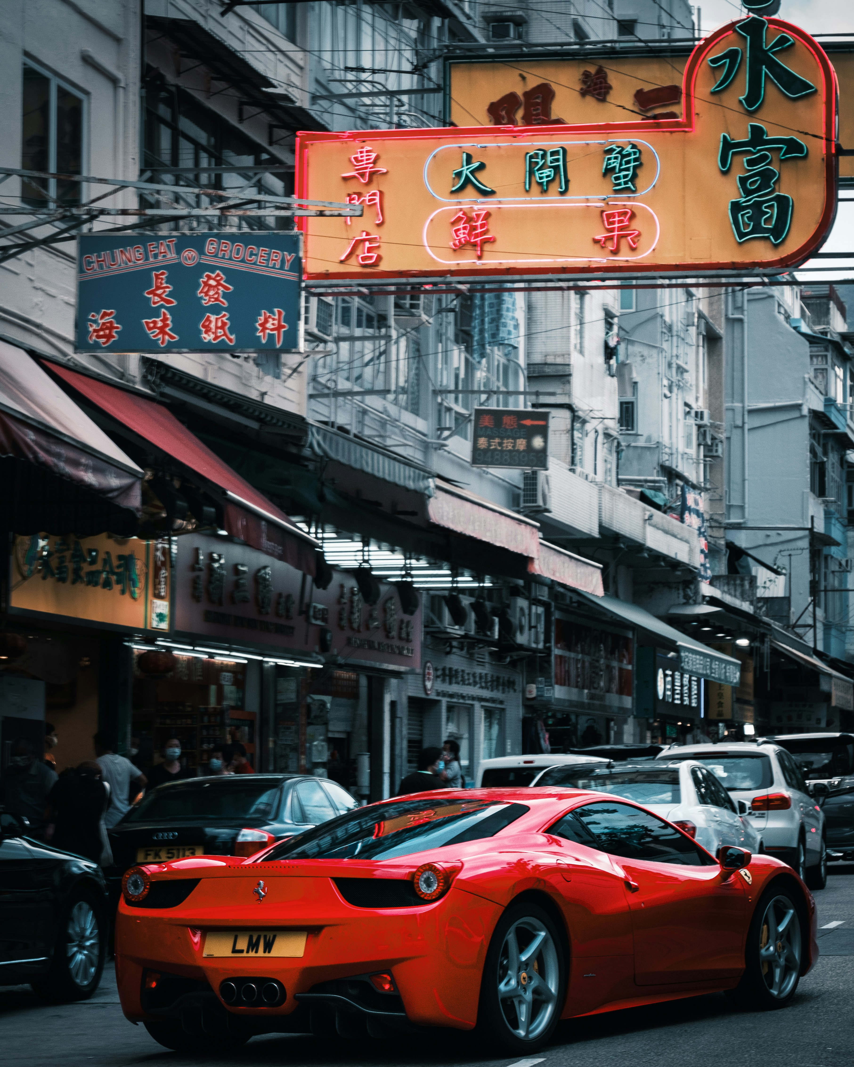 Red car on the street during daytime photo – Free Kowloon city Image on ...