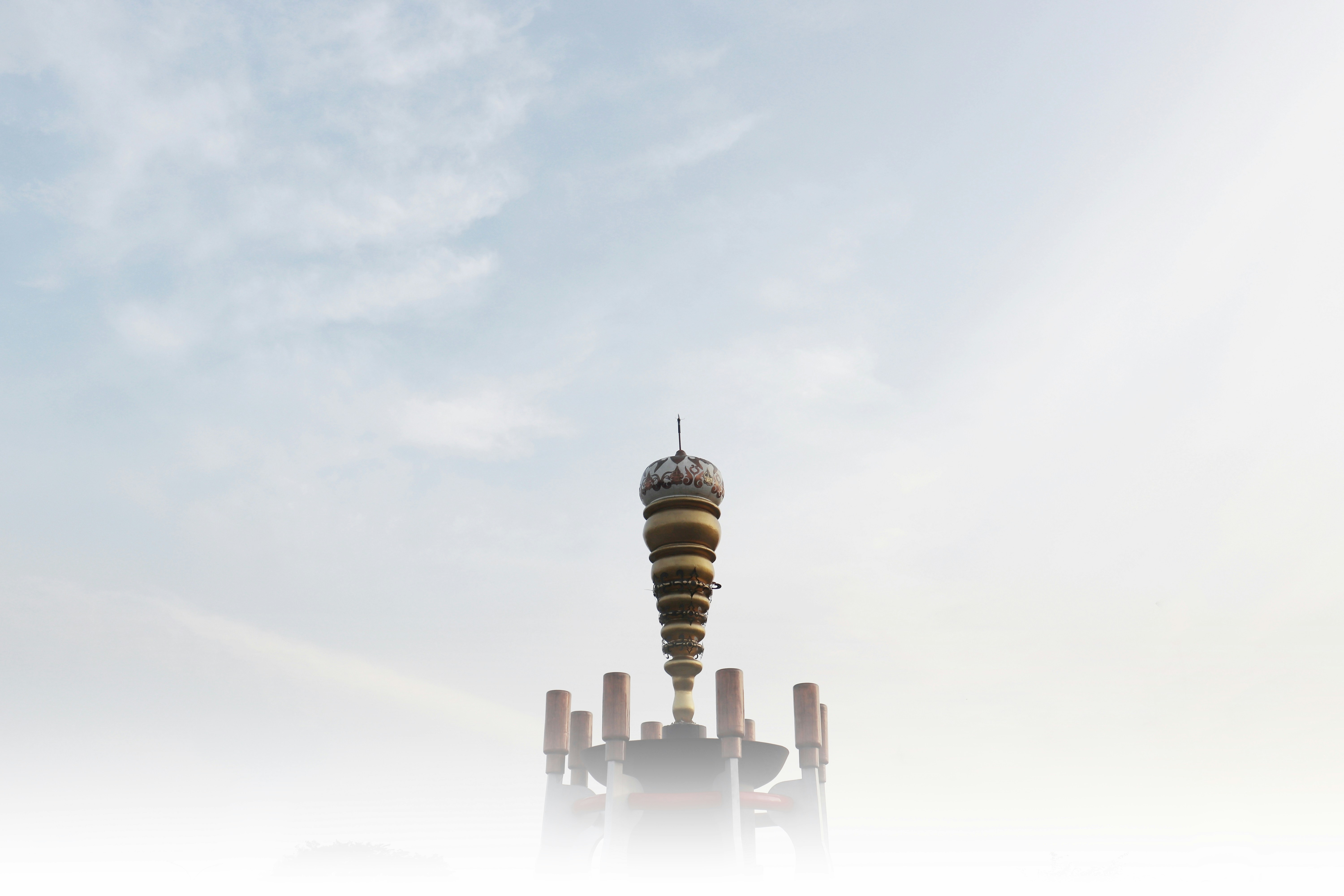 brown and white tower under white sky