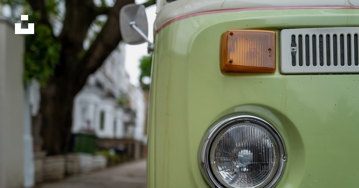 Green Volkswagen Beetle Parked On Sidewalk During Daytime Photo Free