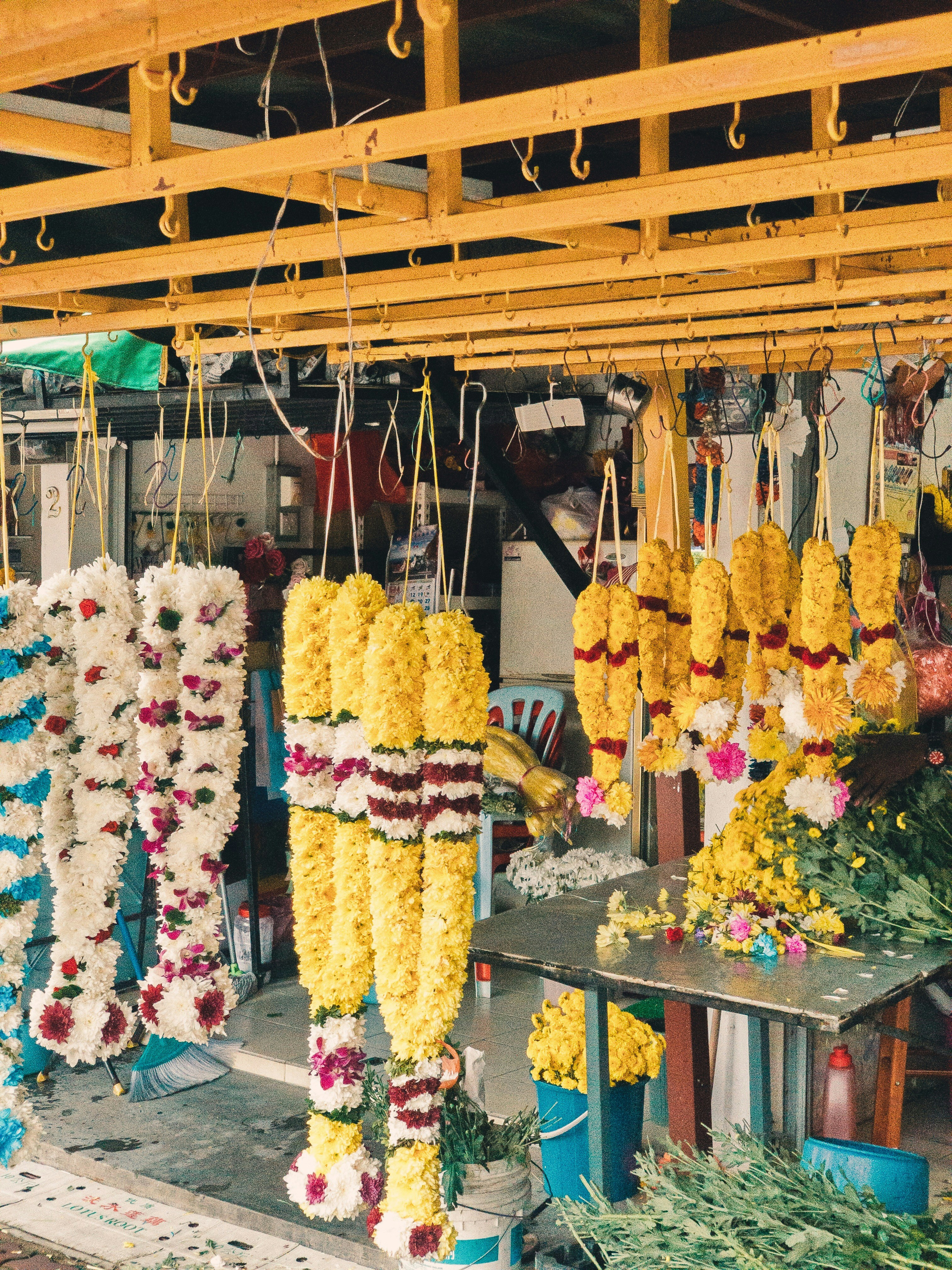 Garlands on Display: A Floral Market Terrace