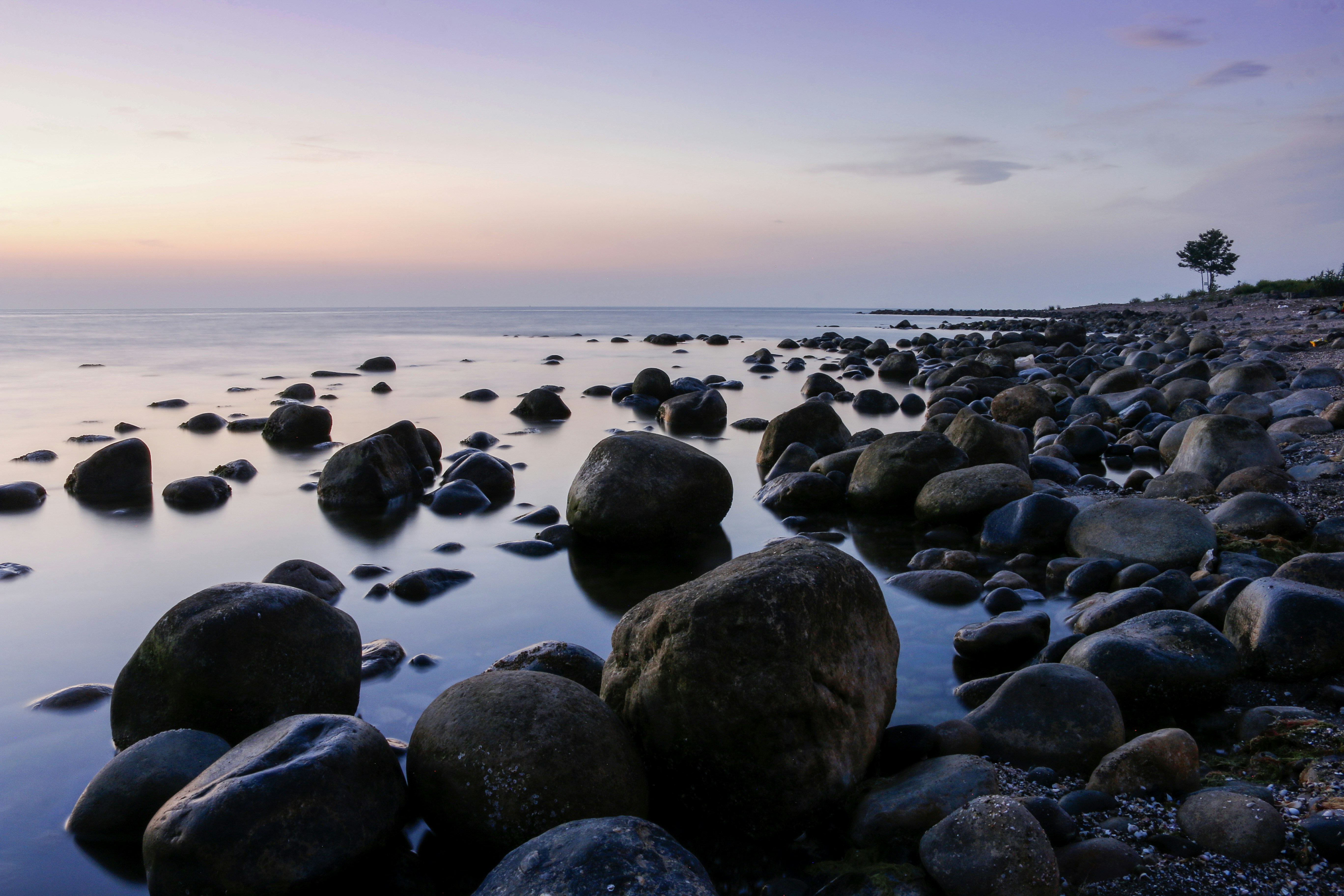 Black and gray rocks on seashore during daytime photo – Free Caspian ...