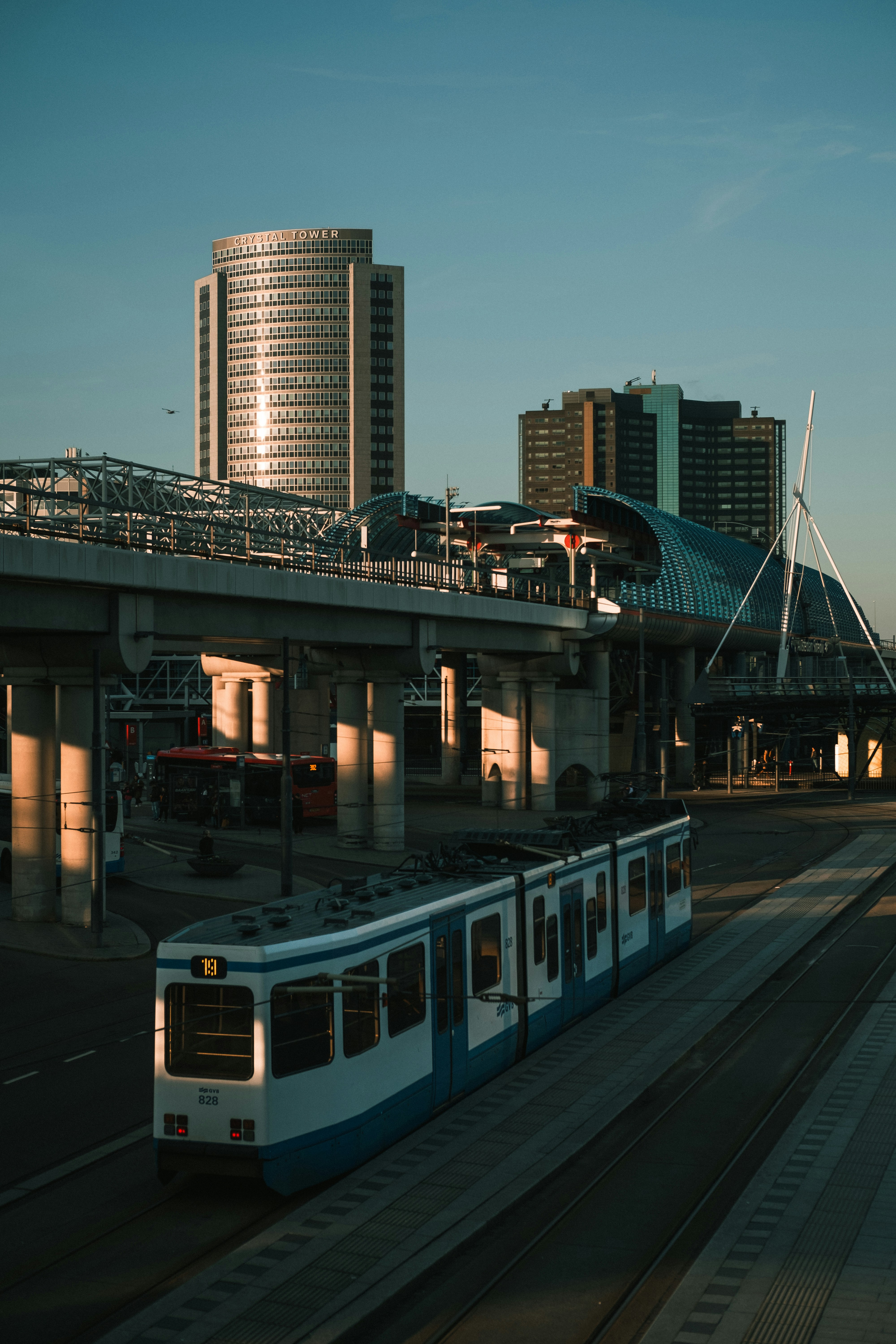 White and blue train on bridge during night time photo – Free ...
