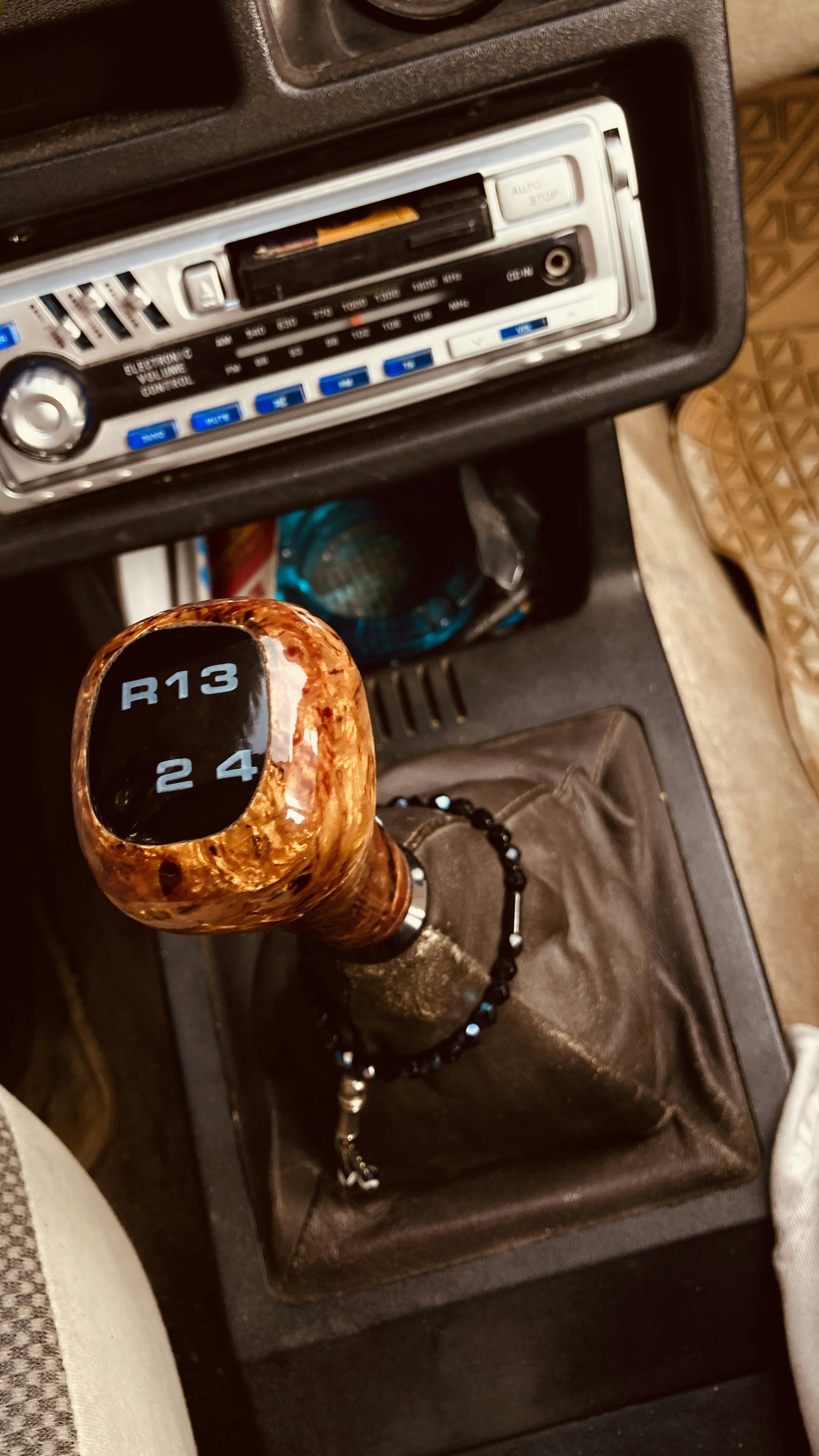 Amber Shift: Vintage gear knob glowing in a quiet car cabin