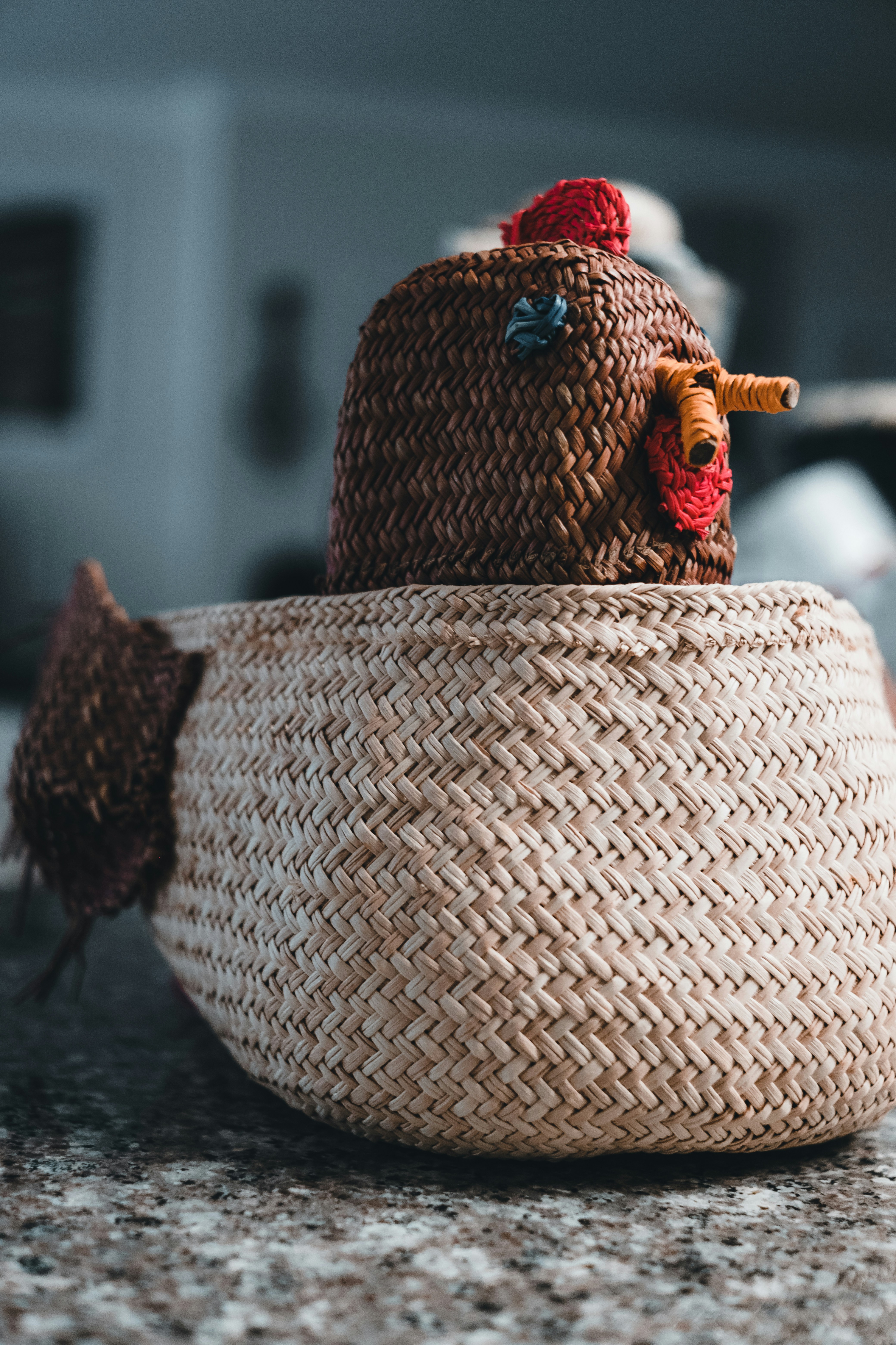 A woven roast: the straw hen sits atop a textured basket coop