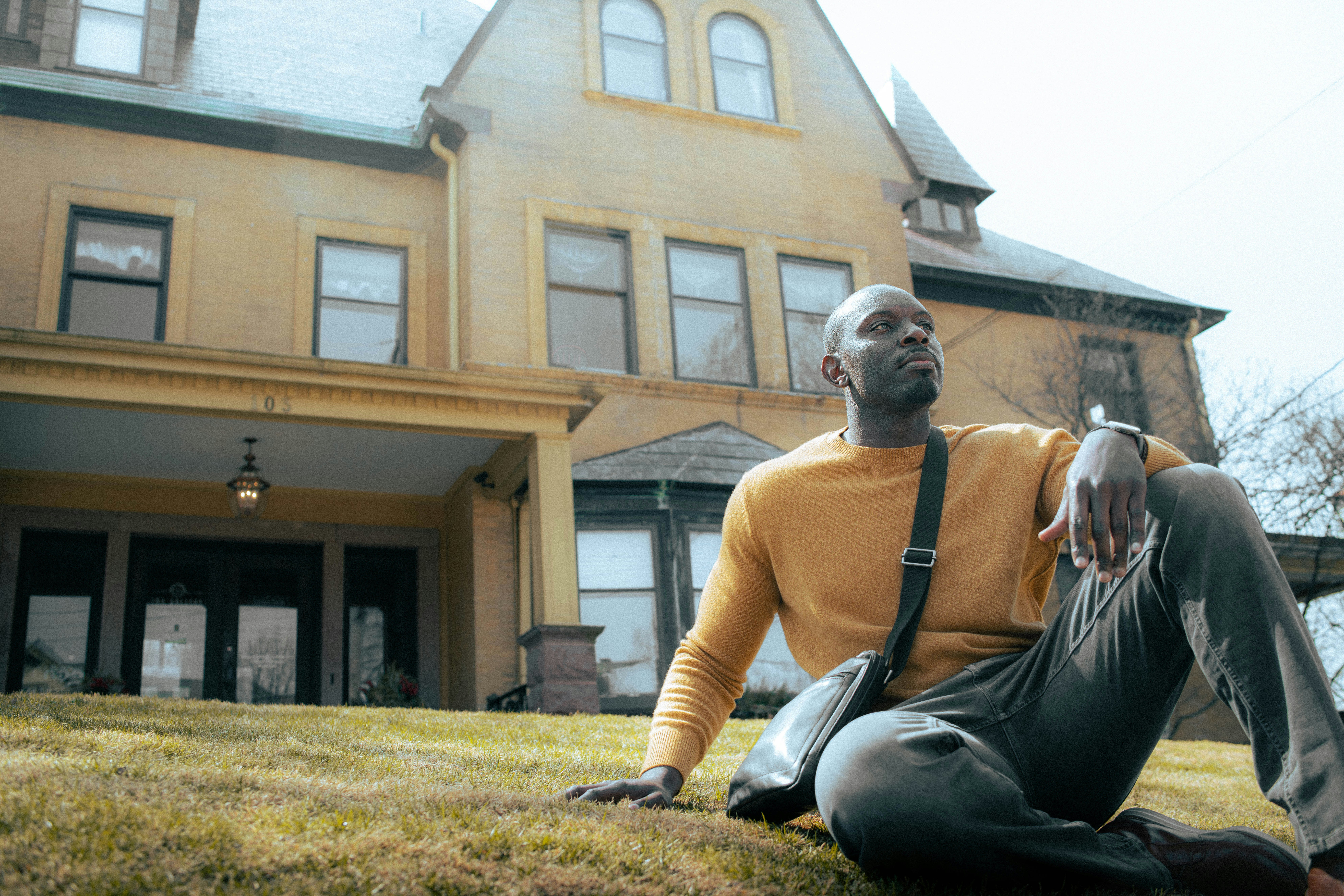 Solace on the Slope: Portrait Before a Yellow Victorian House