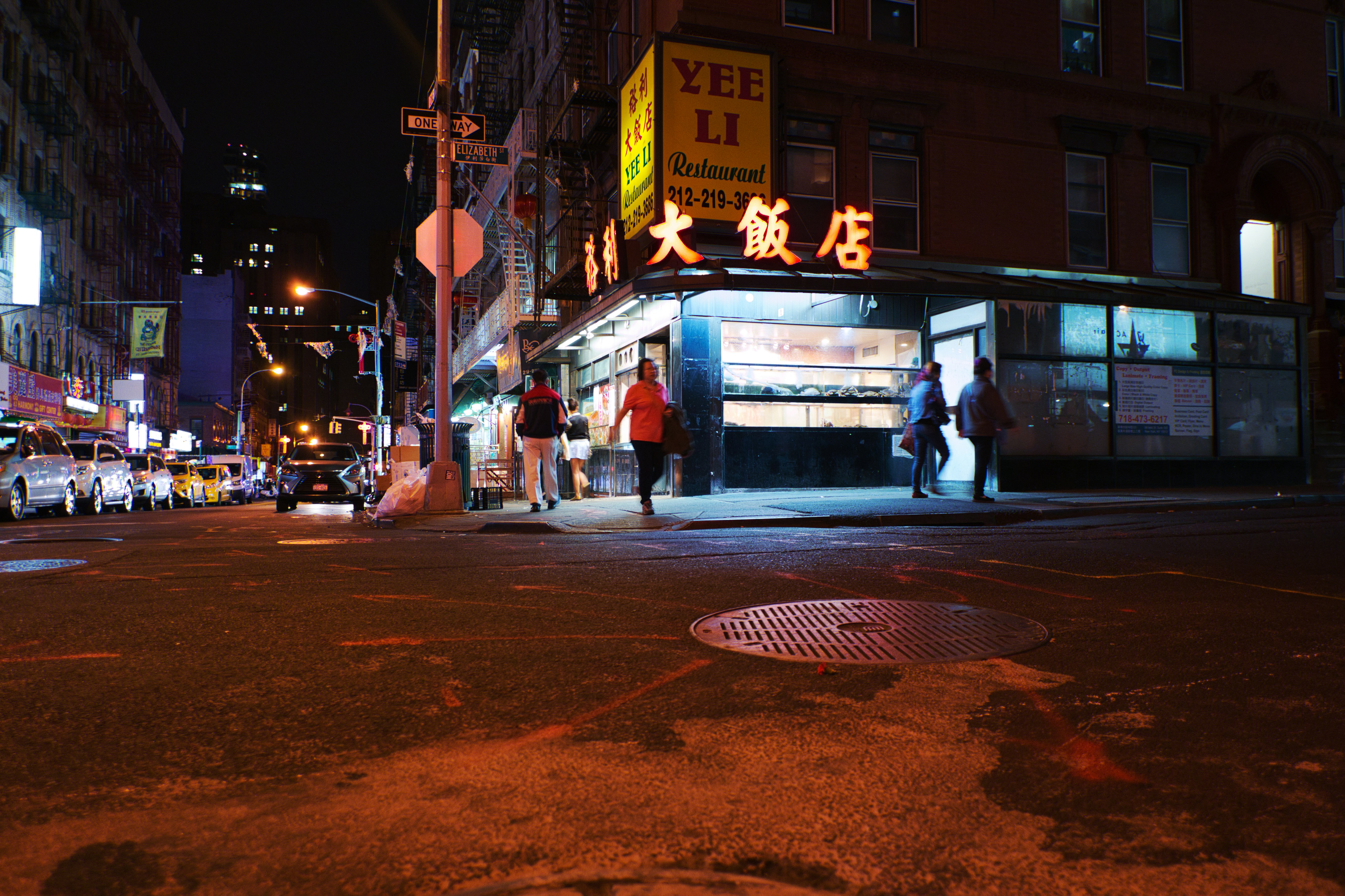 People walking on street during night time photo – Free Usa Image on ...