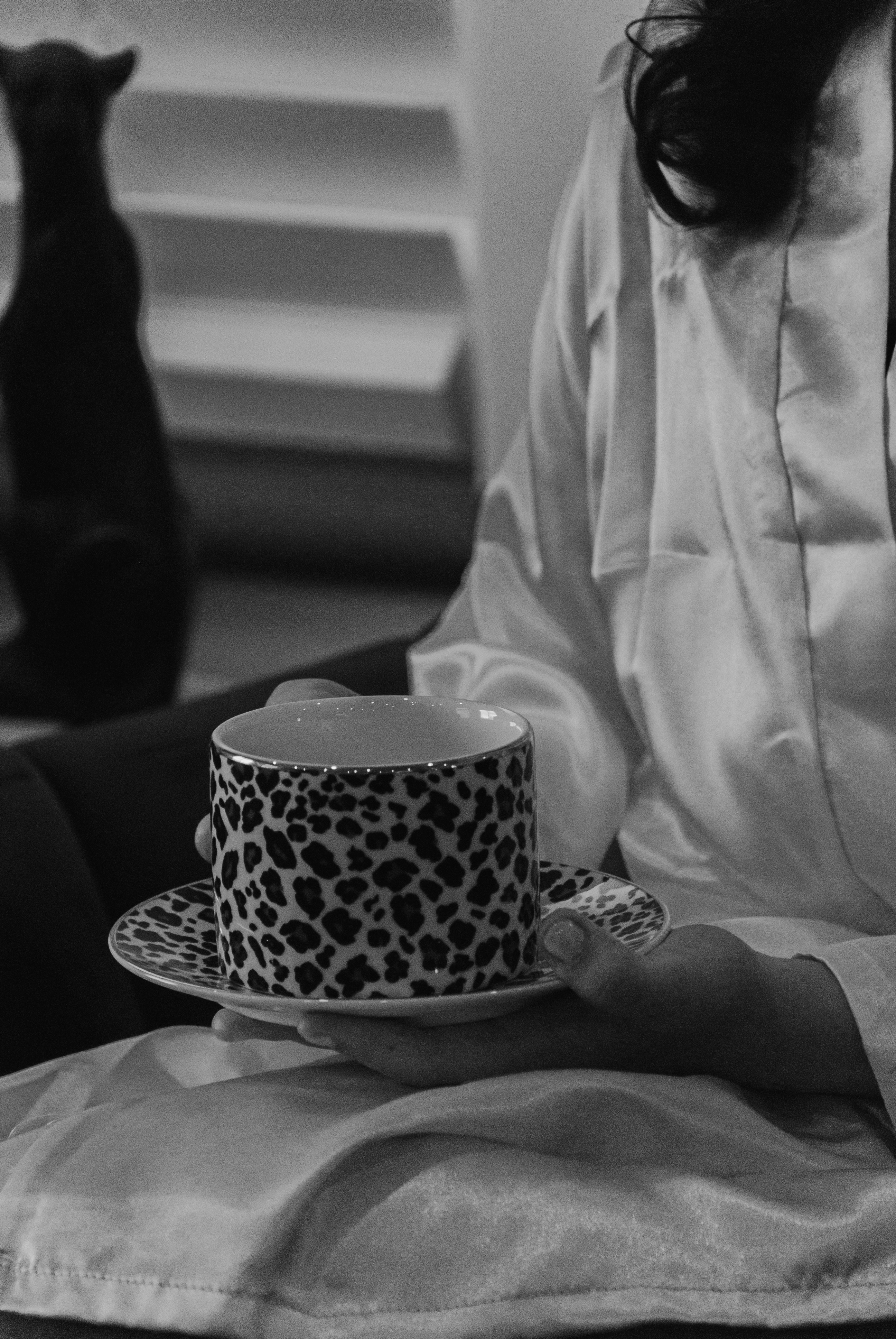 Leopard-Print Teacup in a Calm Domestic Moment