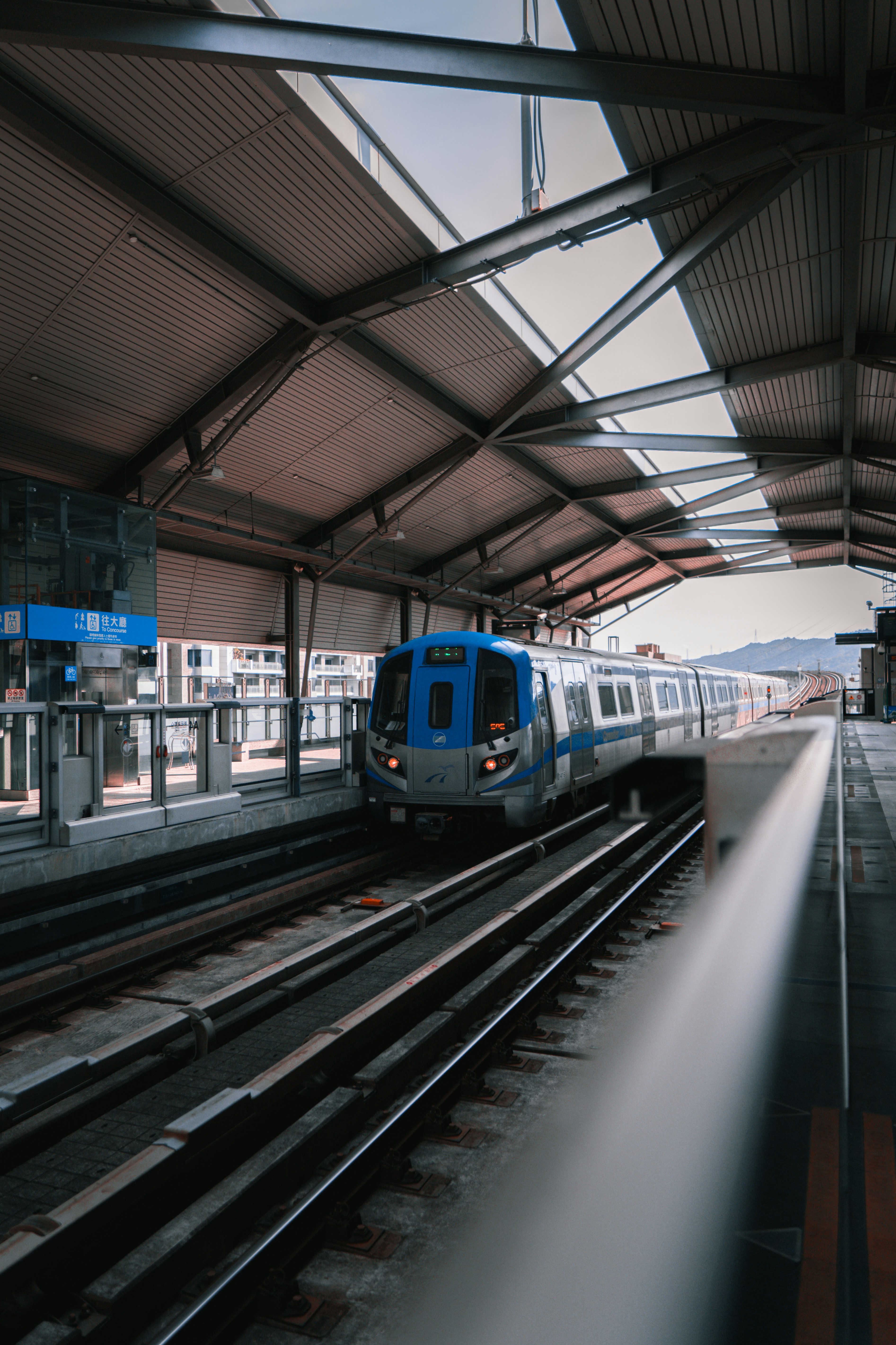 Blue and white train on train station during daytime photo – Free ...