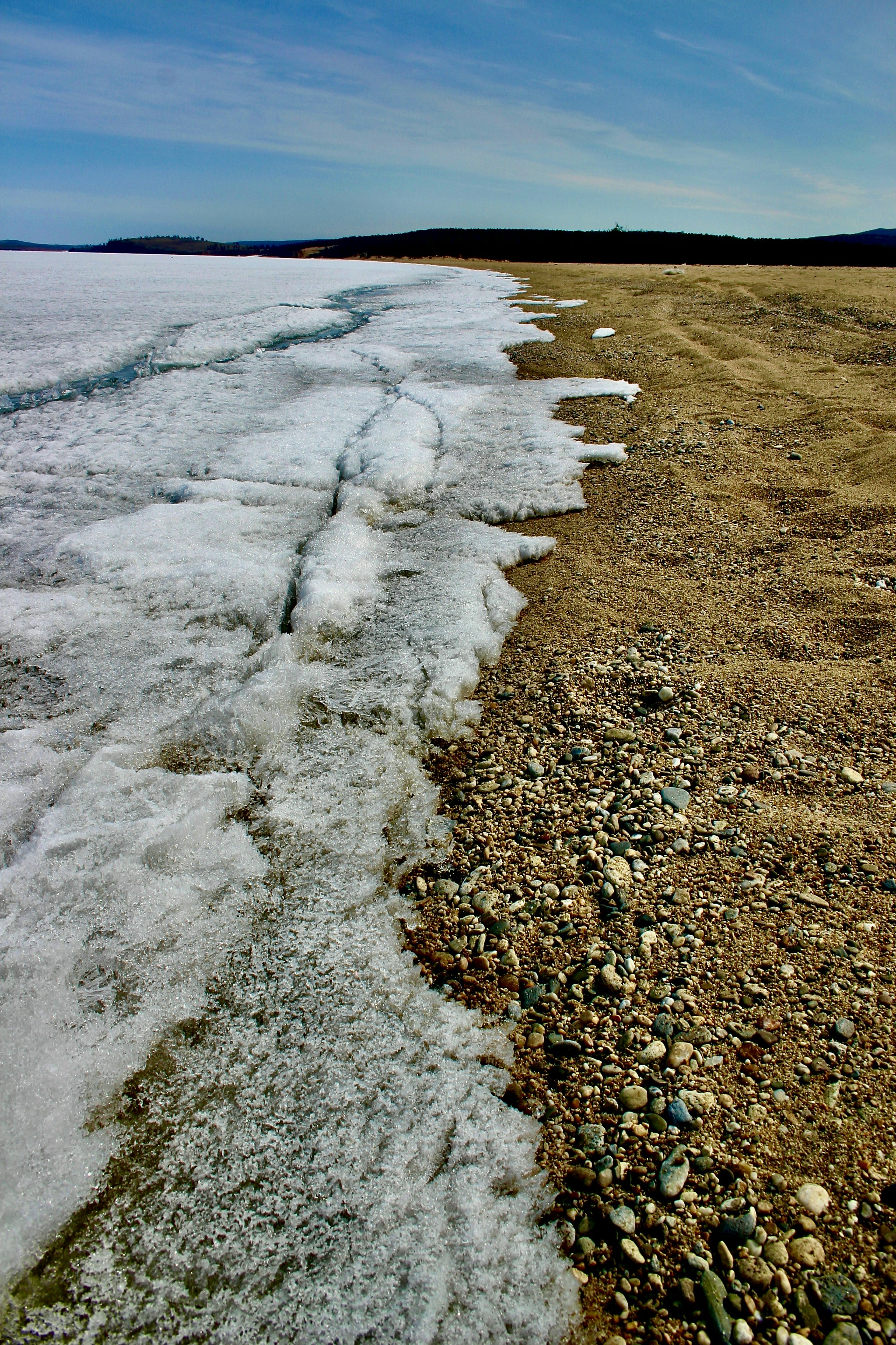 White snow on brown sand near body of water during daytime photo – Free ...