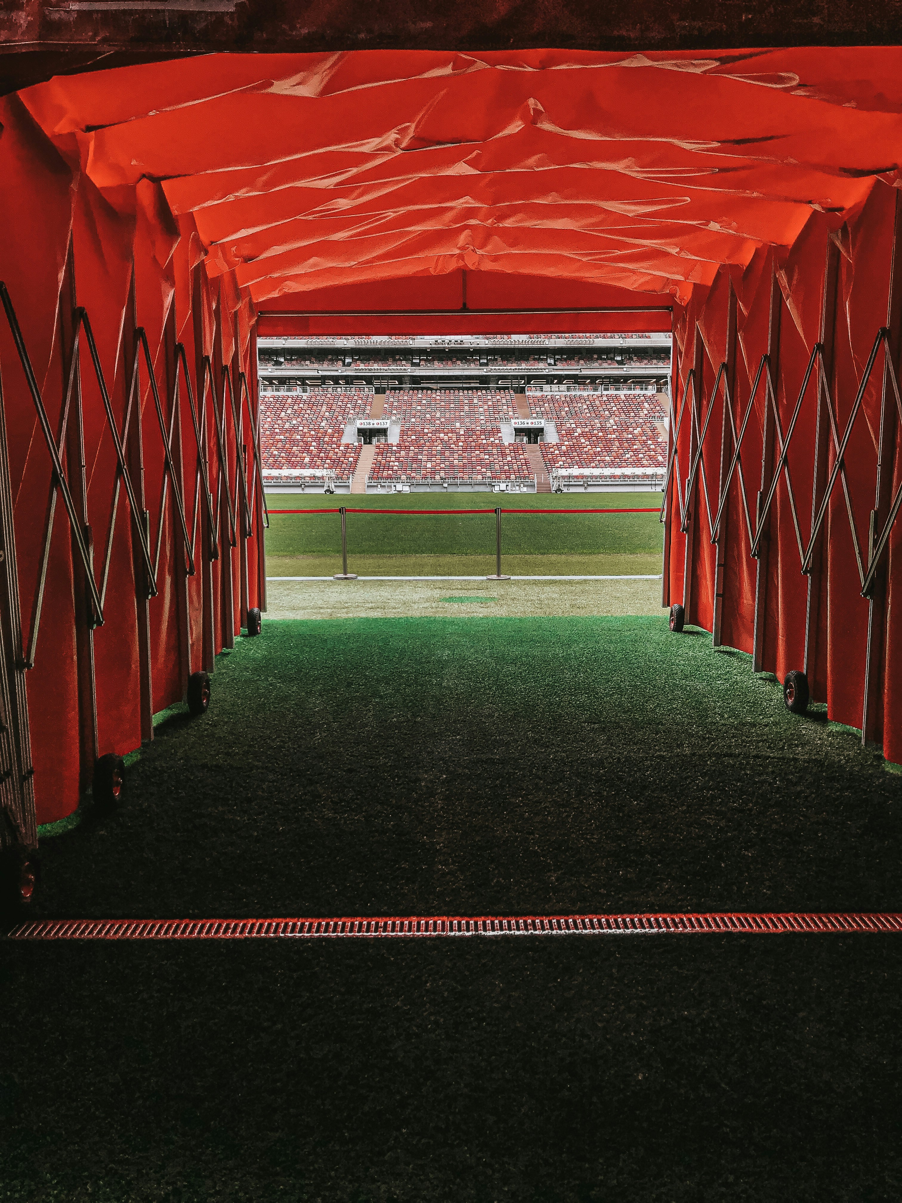 Crimson Corridor to the Open Pitch