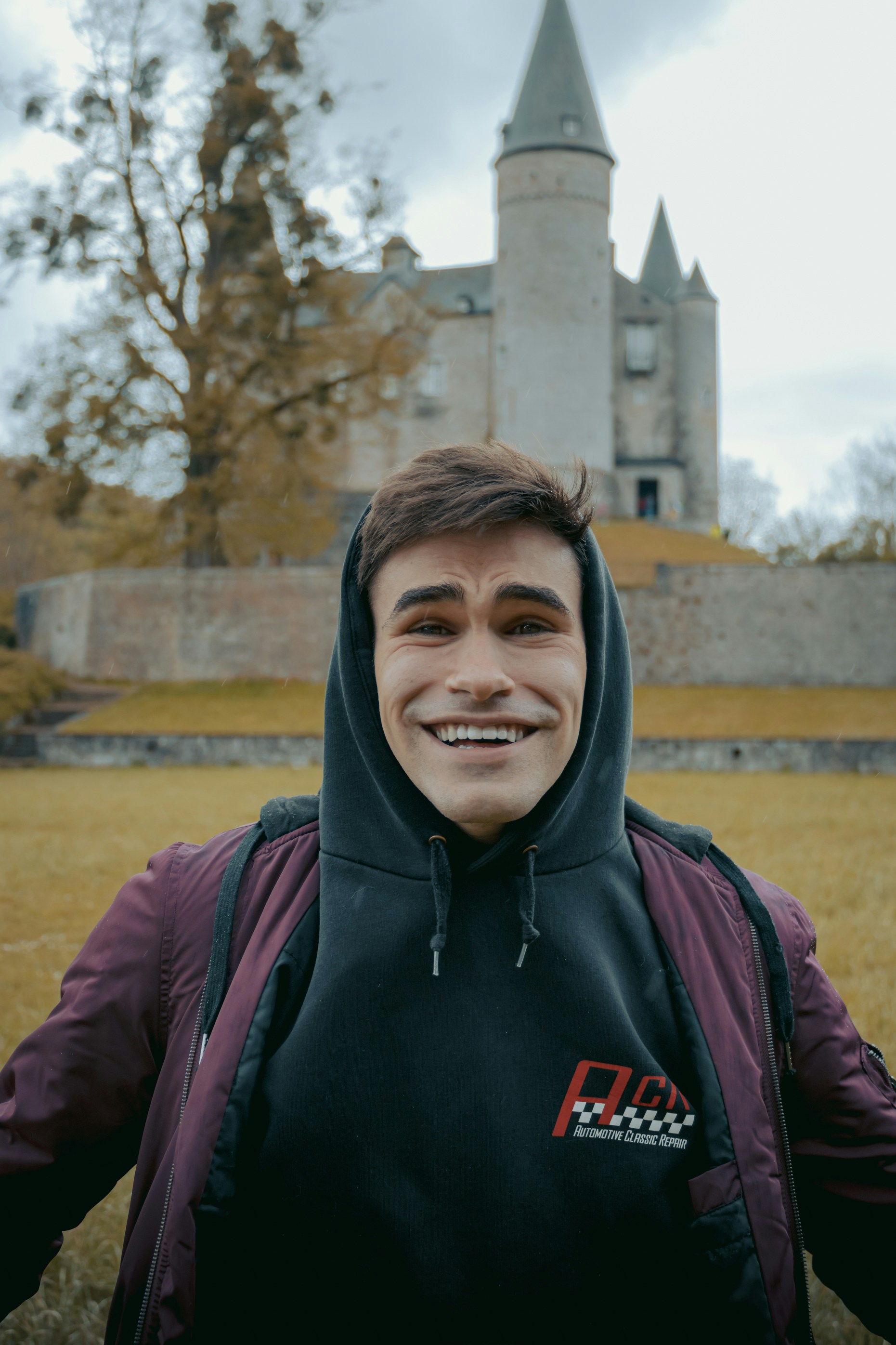 Grin Before the Keep: a candid portrait at a medieval fortress