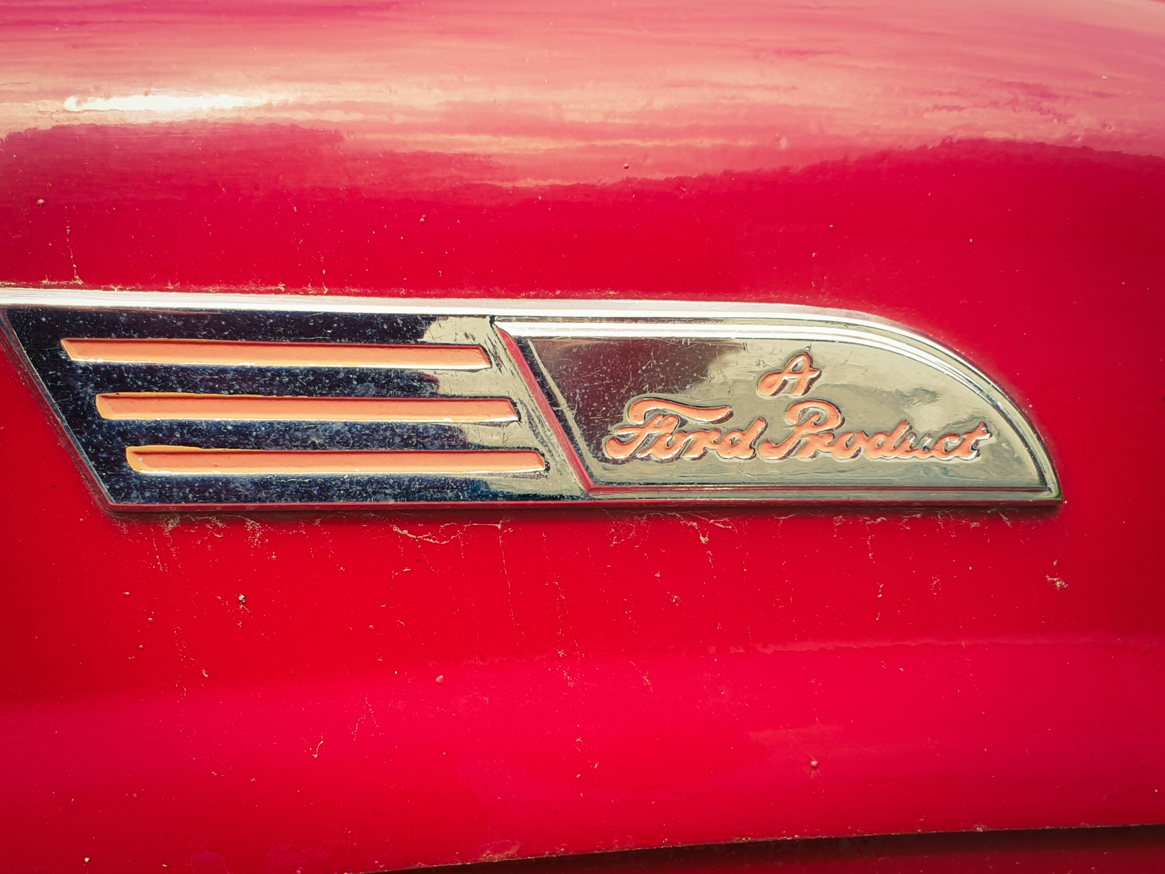 Red and silver ford logo photo – Free Vintage Image on Unsplash