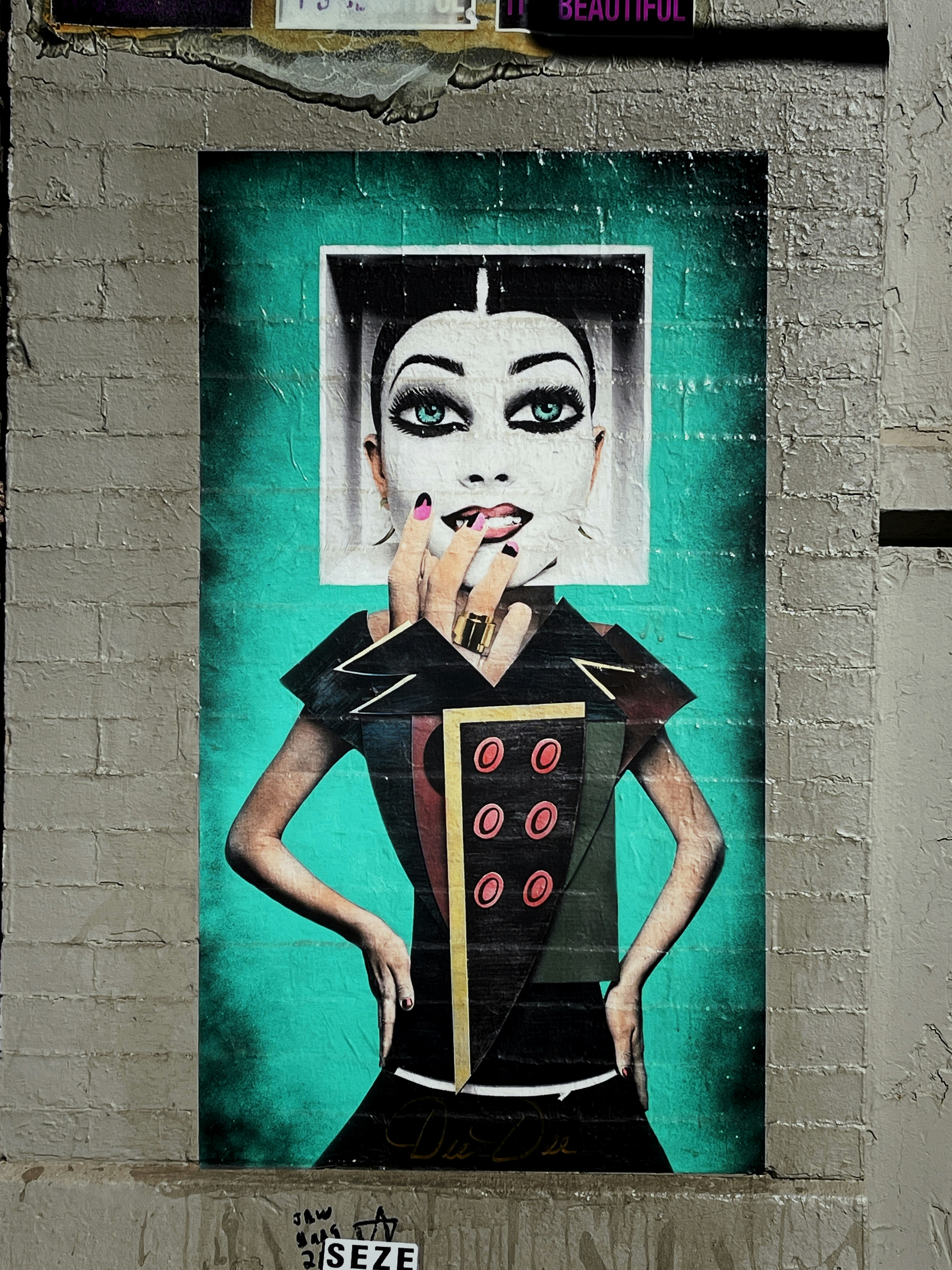 Teal Siren in a Geometric Street Mural