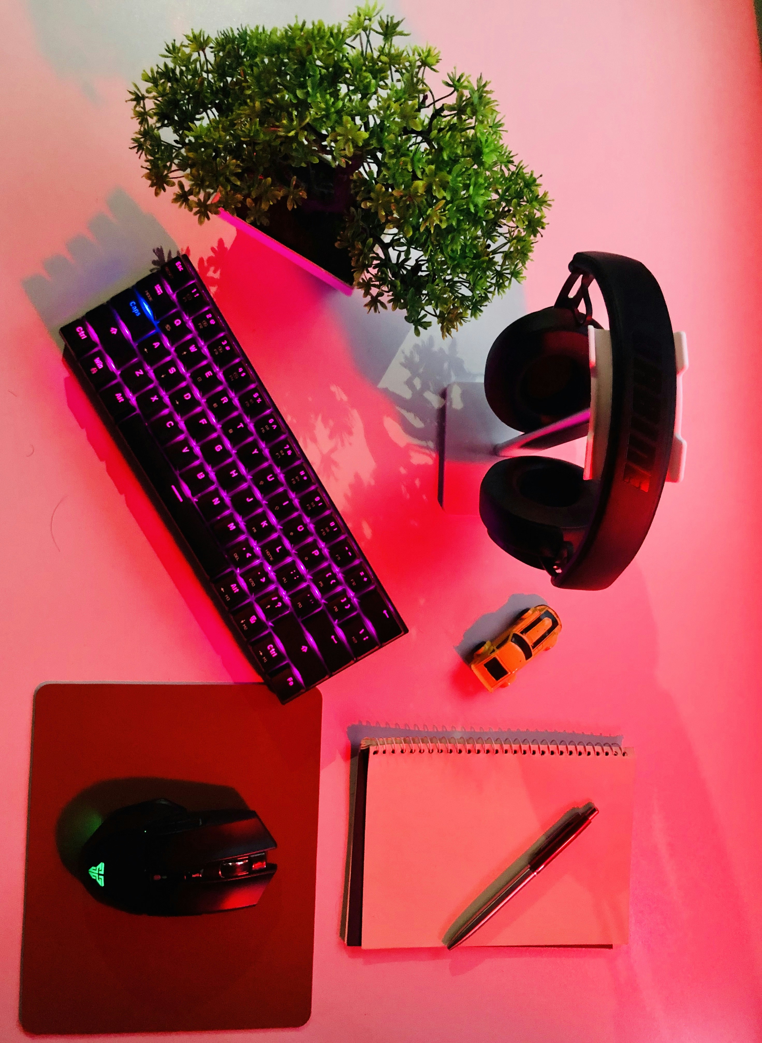 Neon Desk: A Colorful Tech Setup in Red Light