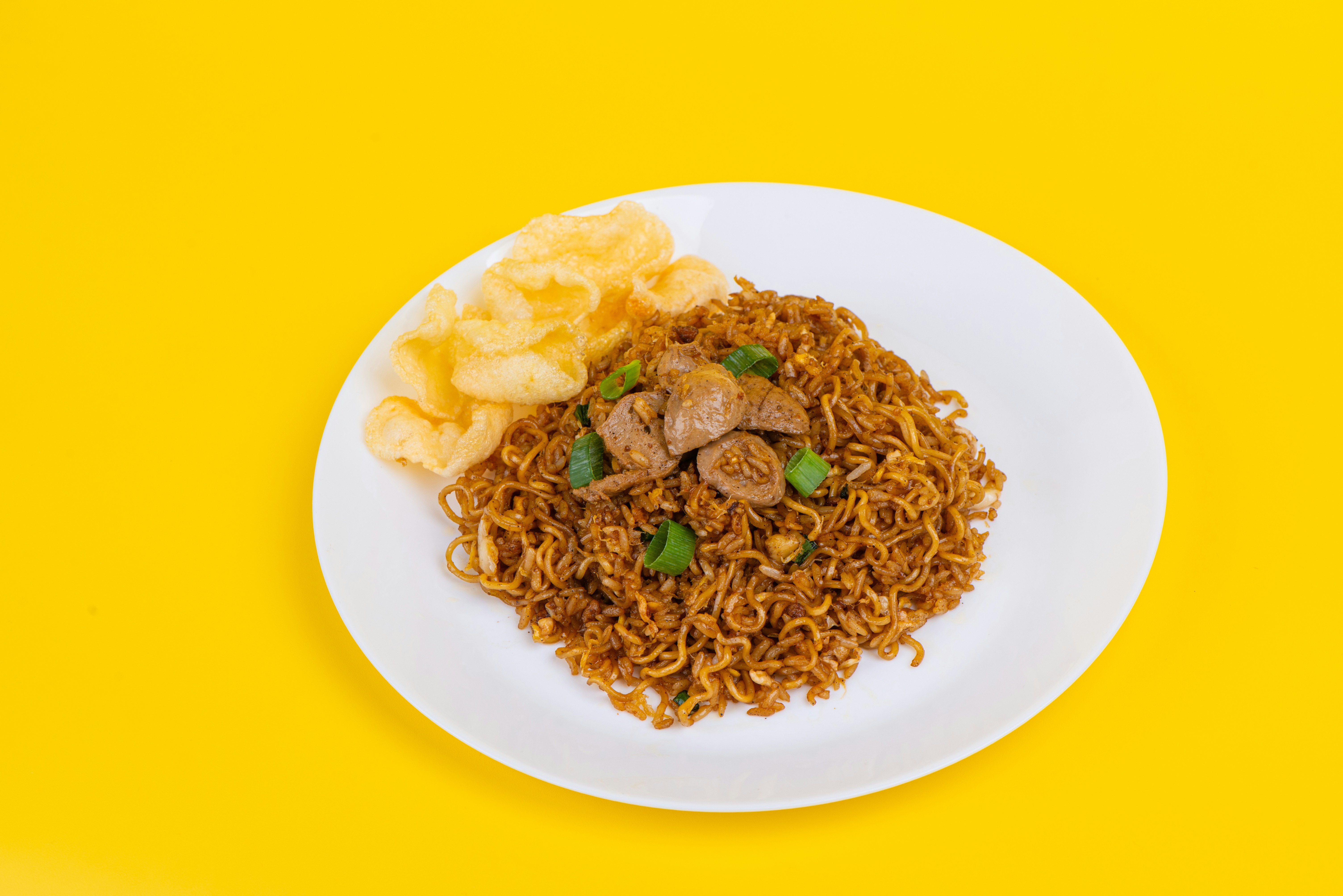 Neon Yellow Spotlight on Savory Yakisoba with Green Onions