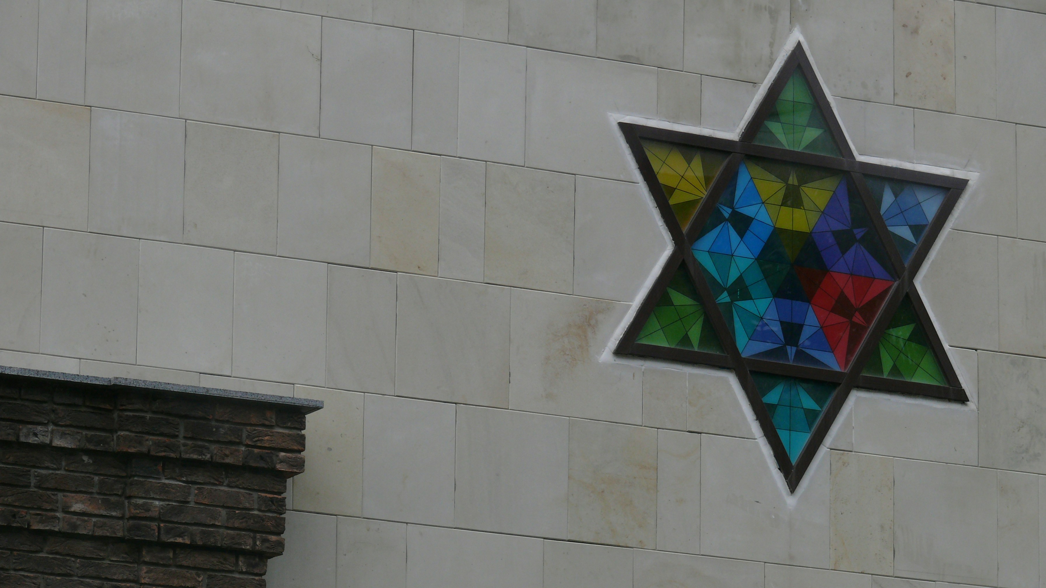 Geometric Star on a Stone Facade