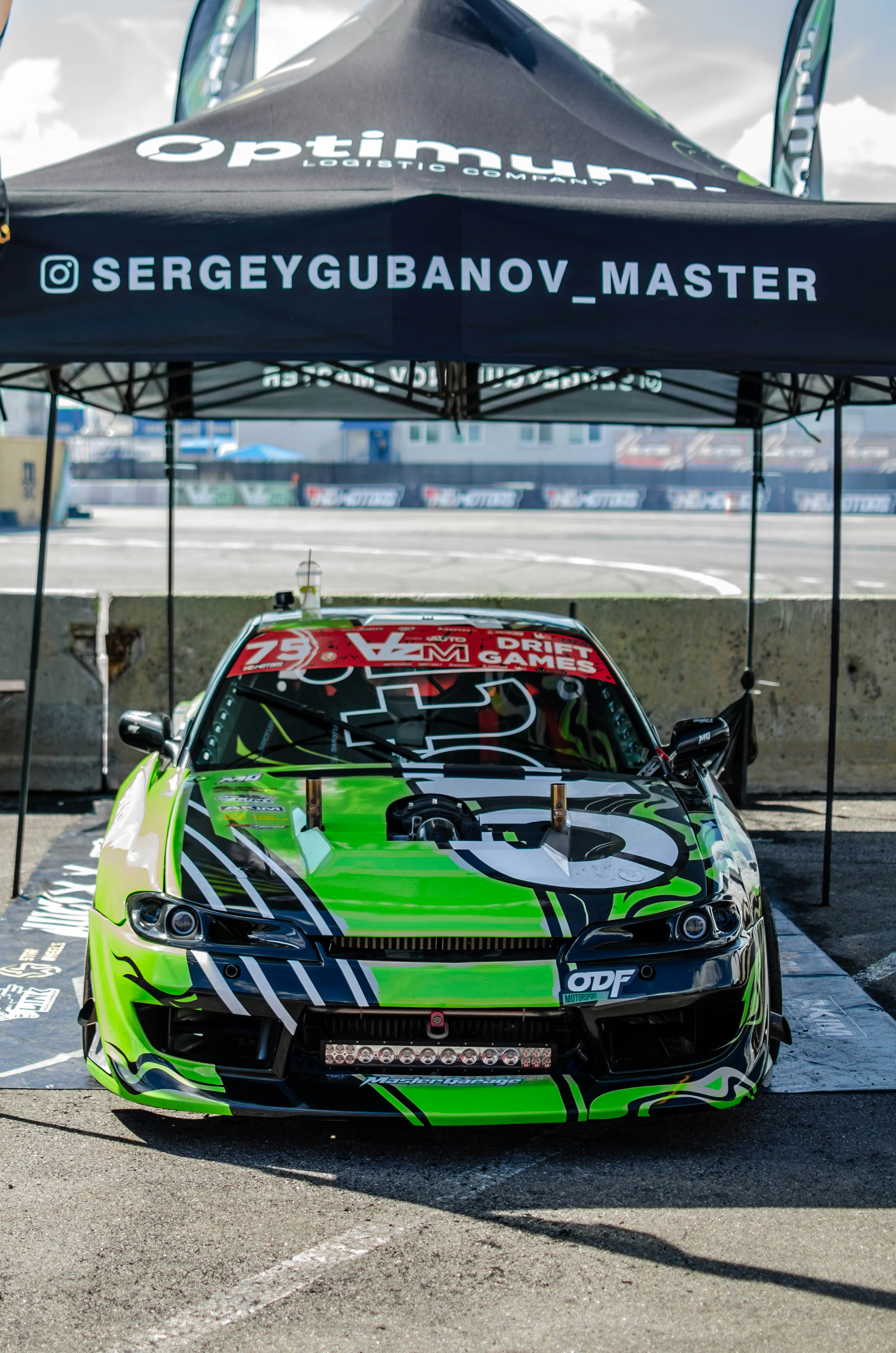 Under the Tent: Neon Green Drift Car Ready for battle