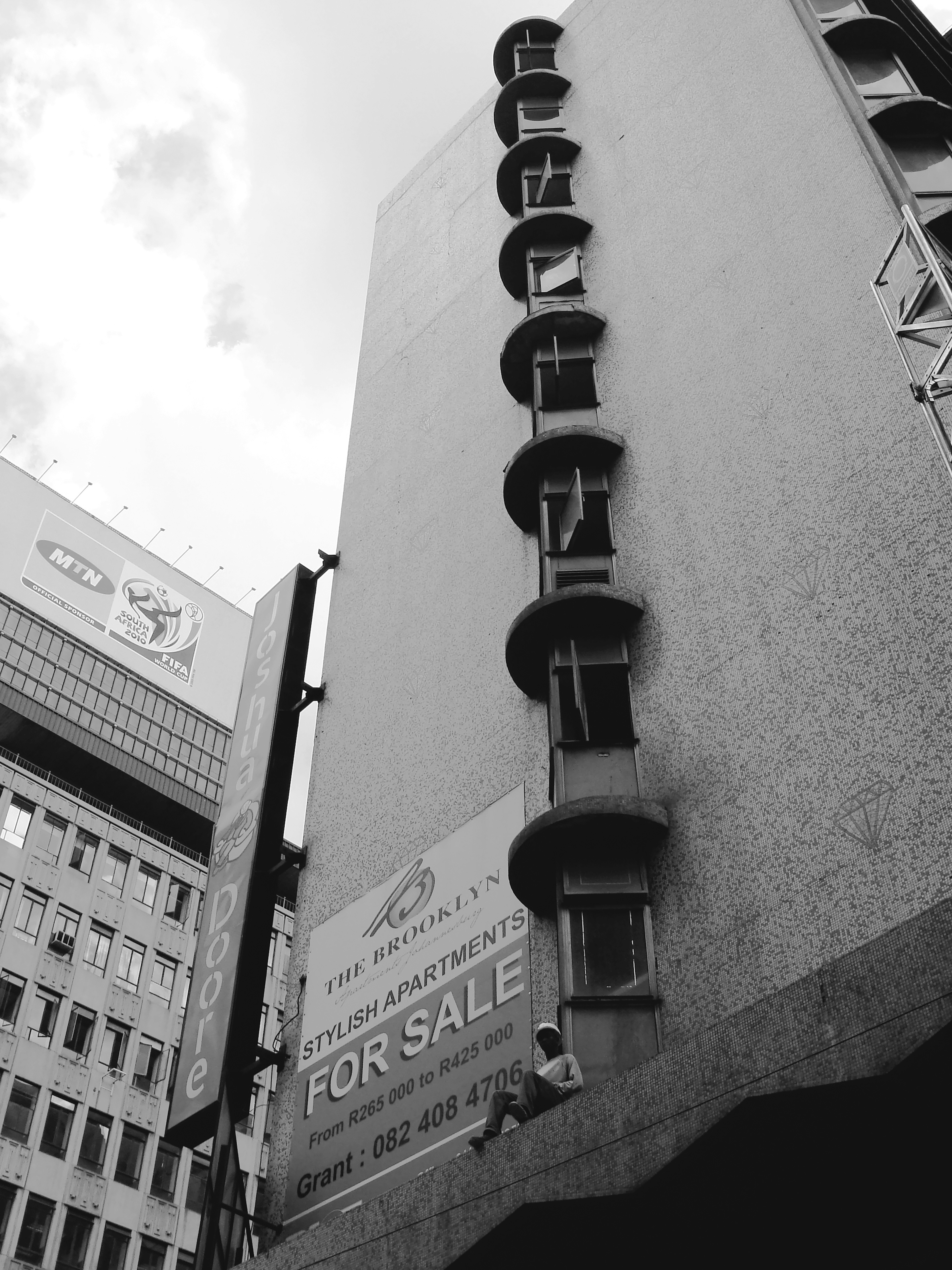 Grayscale photo of concrete building photo – Free Johannesburg Image on ...