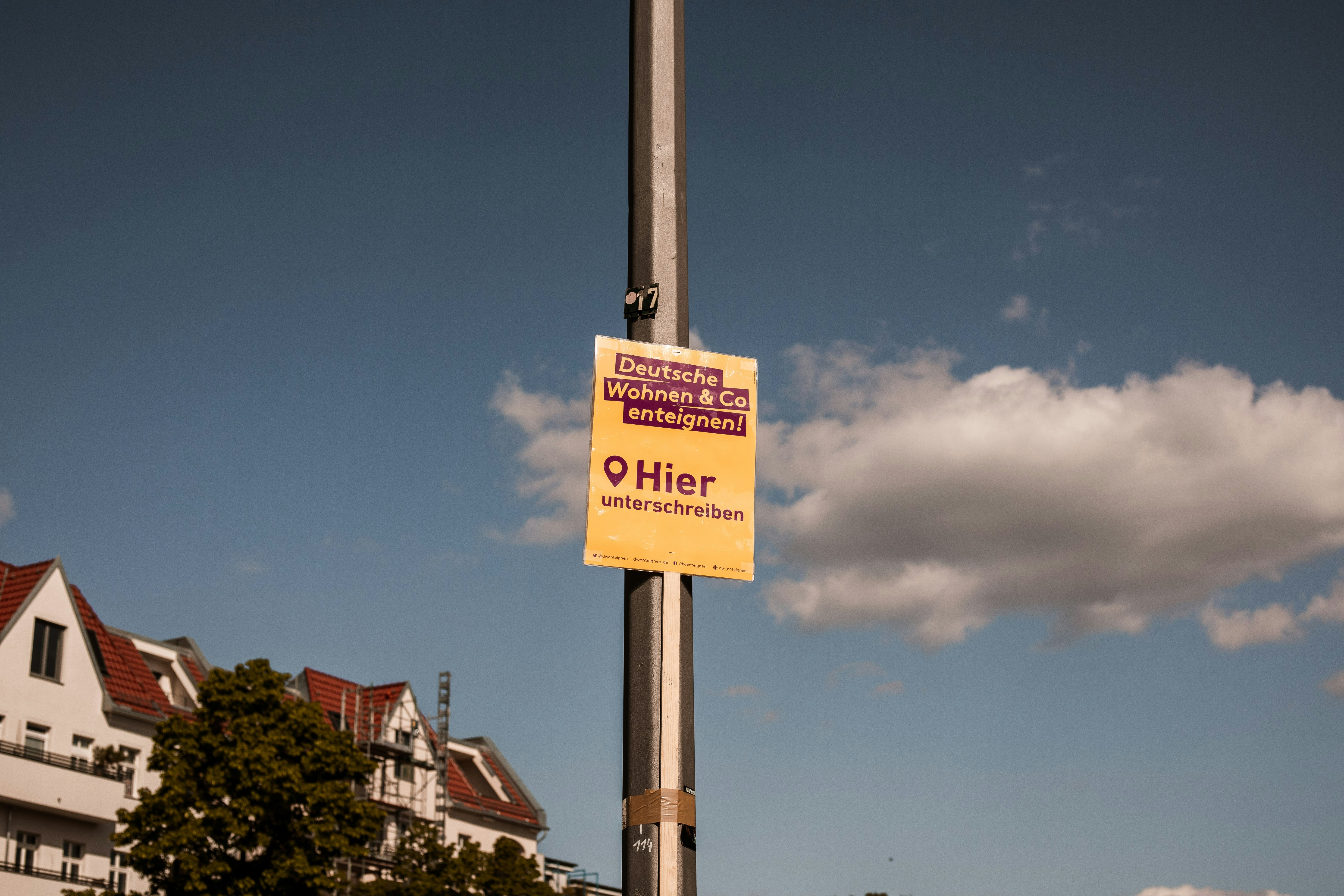 White and blue street sign photo – Free Berlin Image on Unsplash