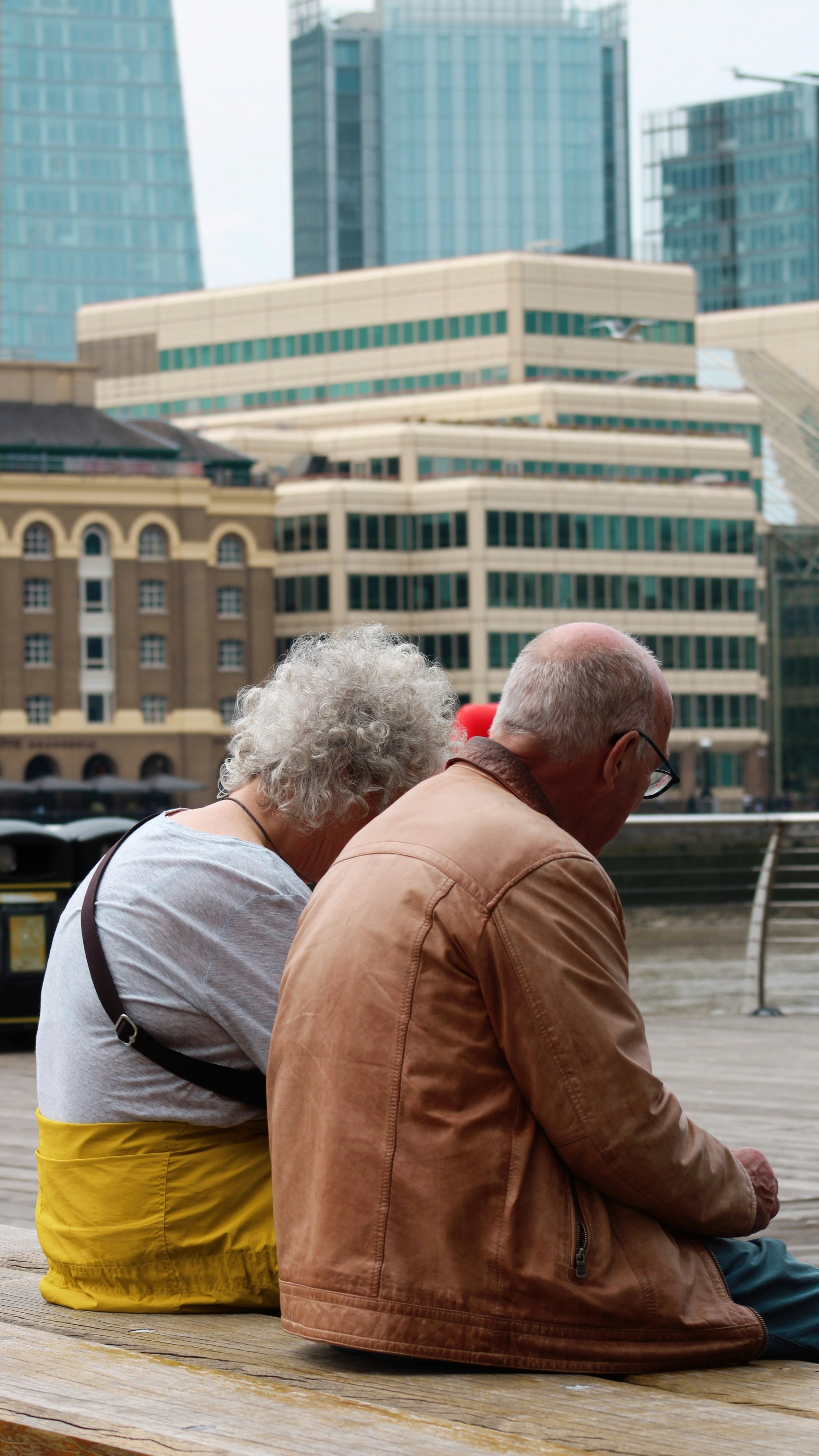 old couple sitting in london