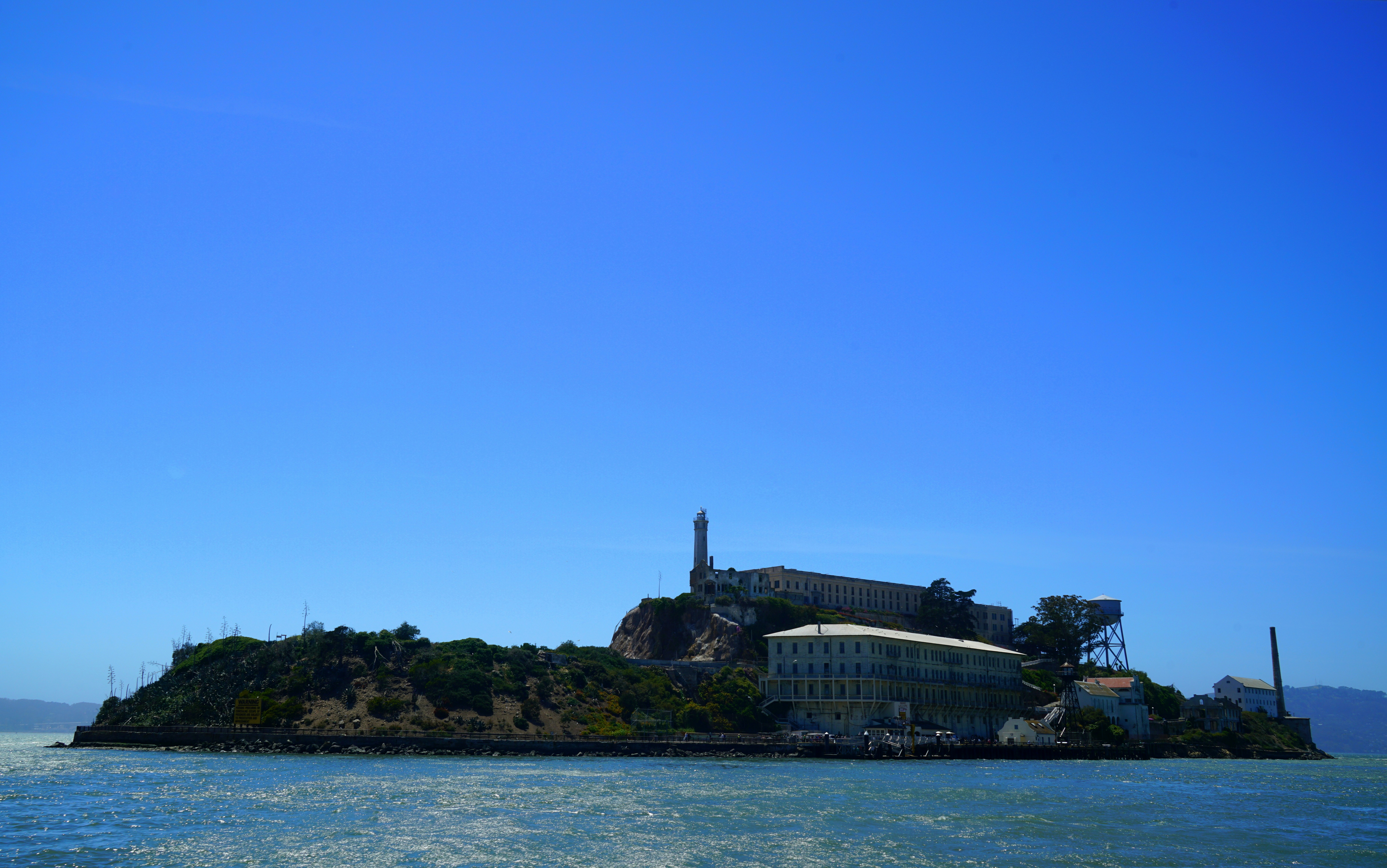 Echoes of History: Alcatraz Island Under the Clear Blue Sky