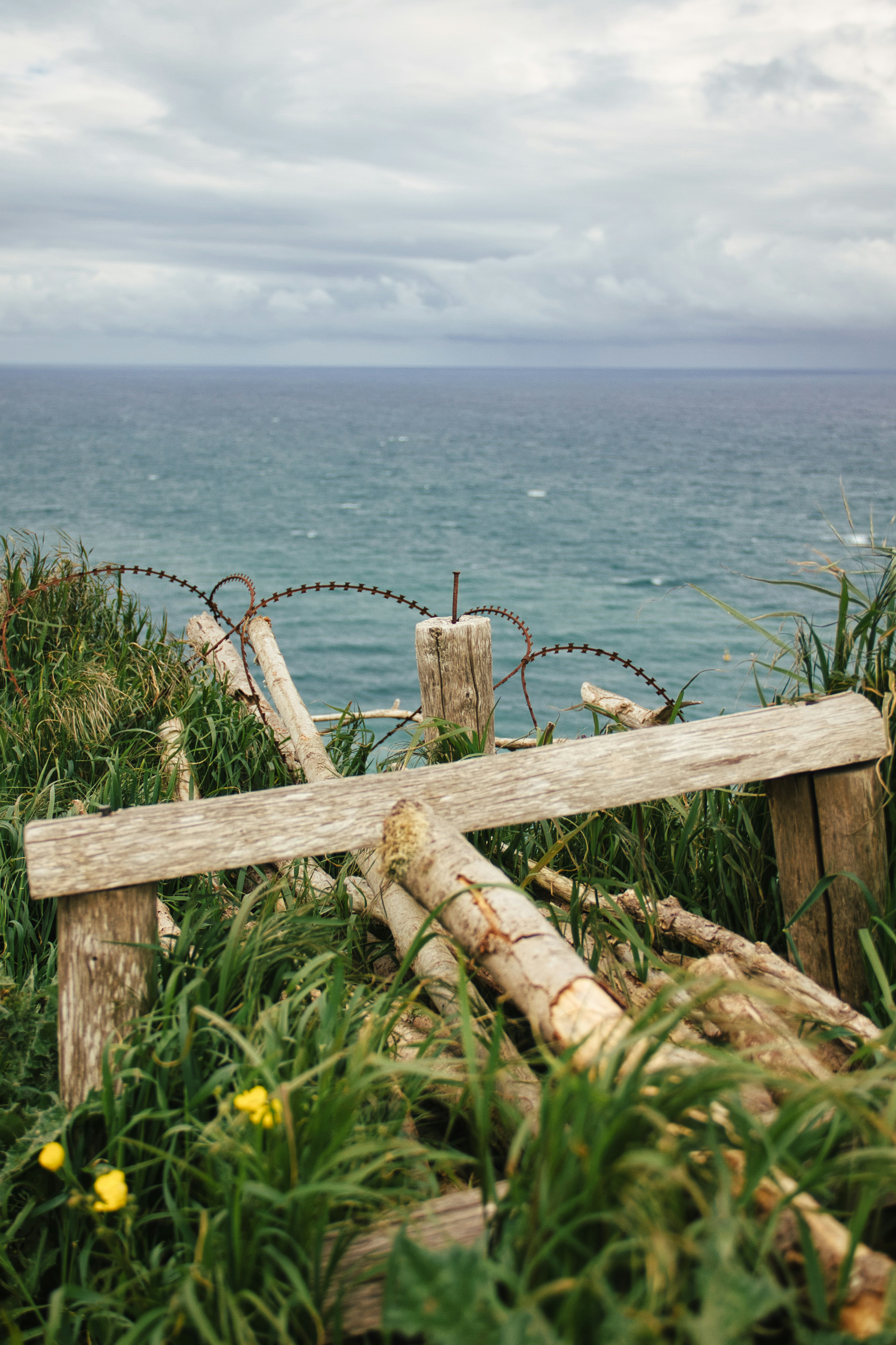 Weathered Rails Framing the Sea Horizon