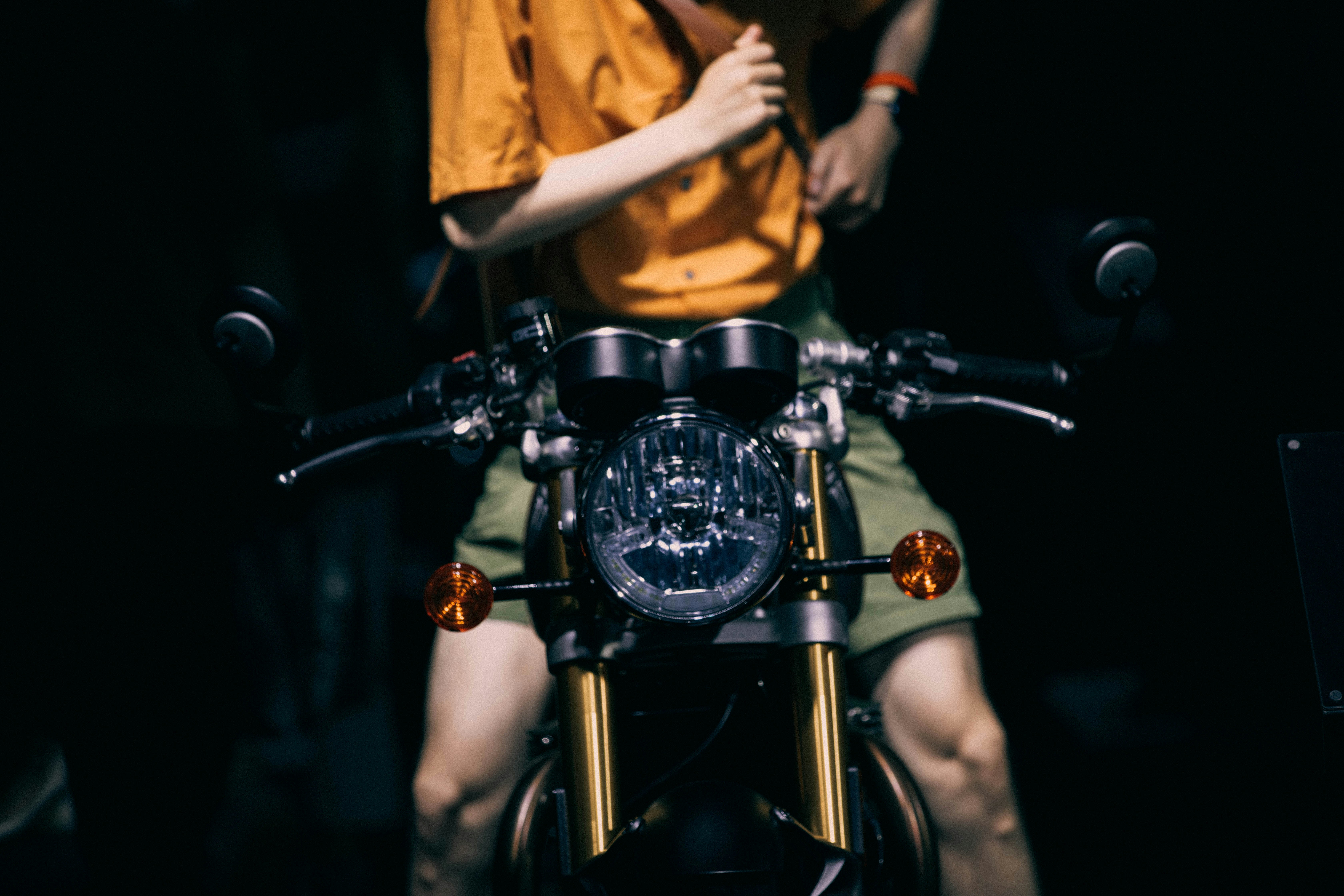 Midnight Front: A Motorcycle Portrait with a Circular Eye