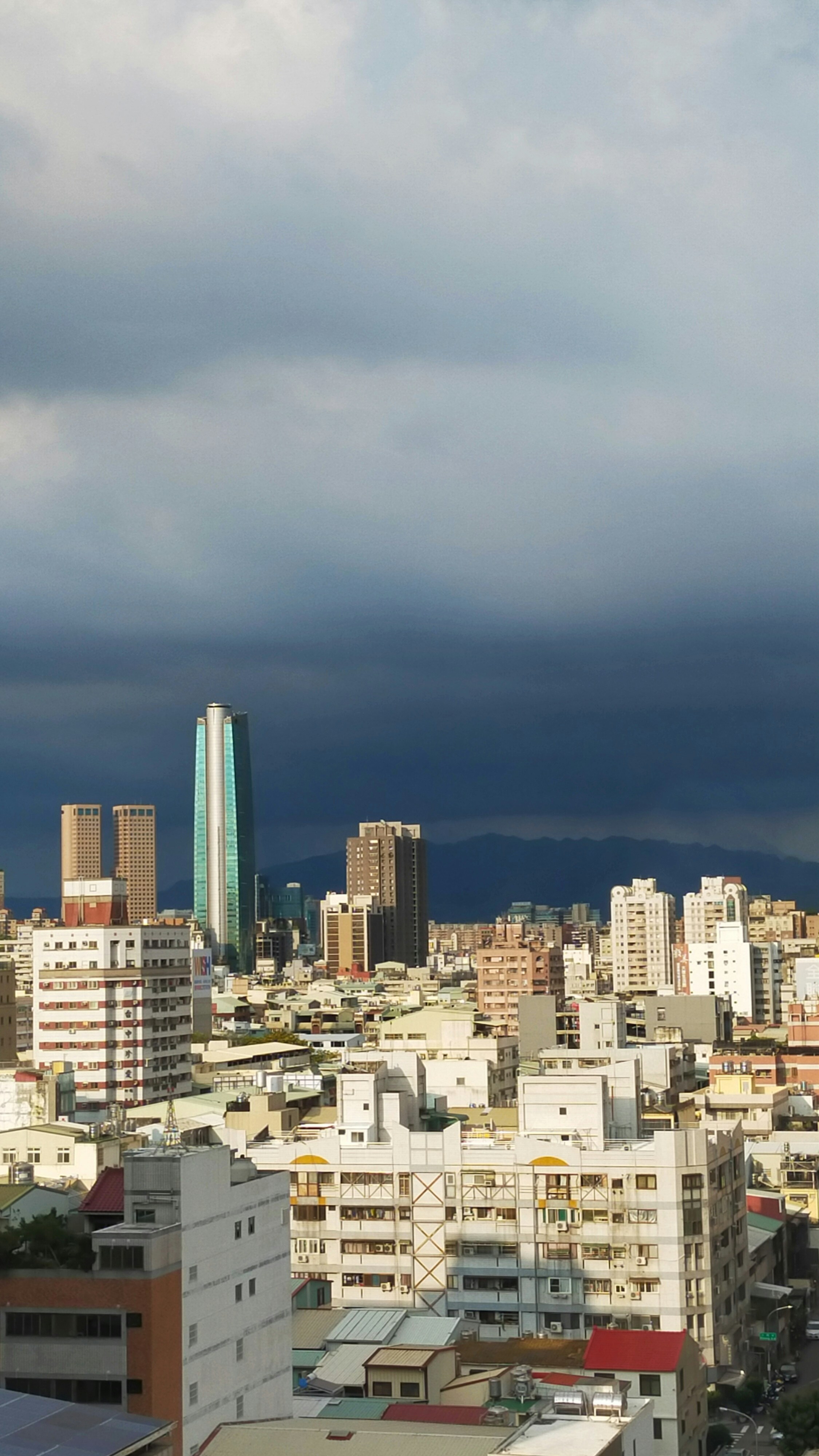 Urban Horizon Under Gathering Storm