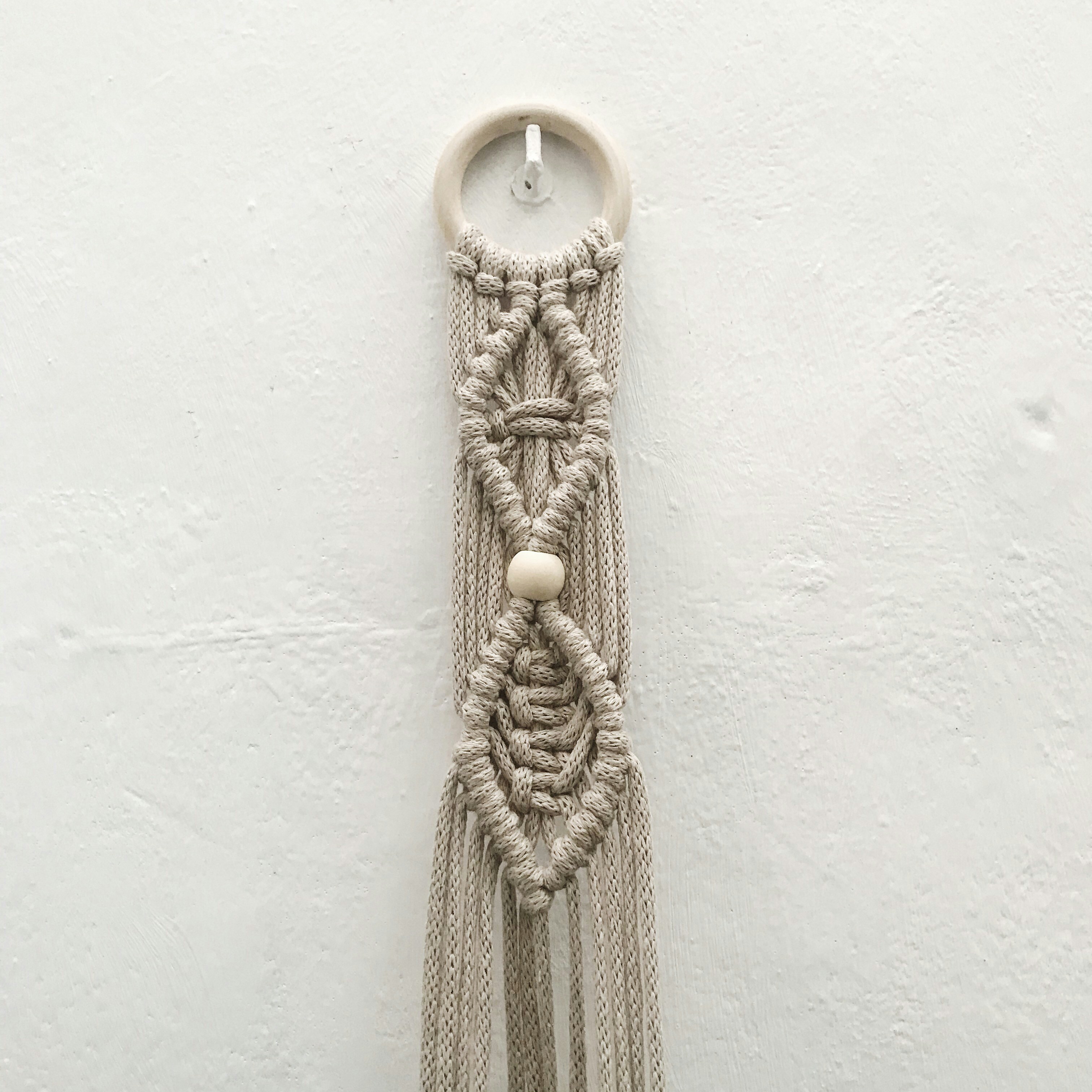 Circular Ring and Knotted Symmetry: Pale Macramé Wall Hanging