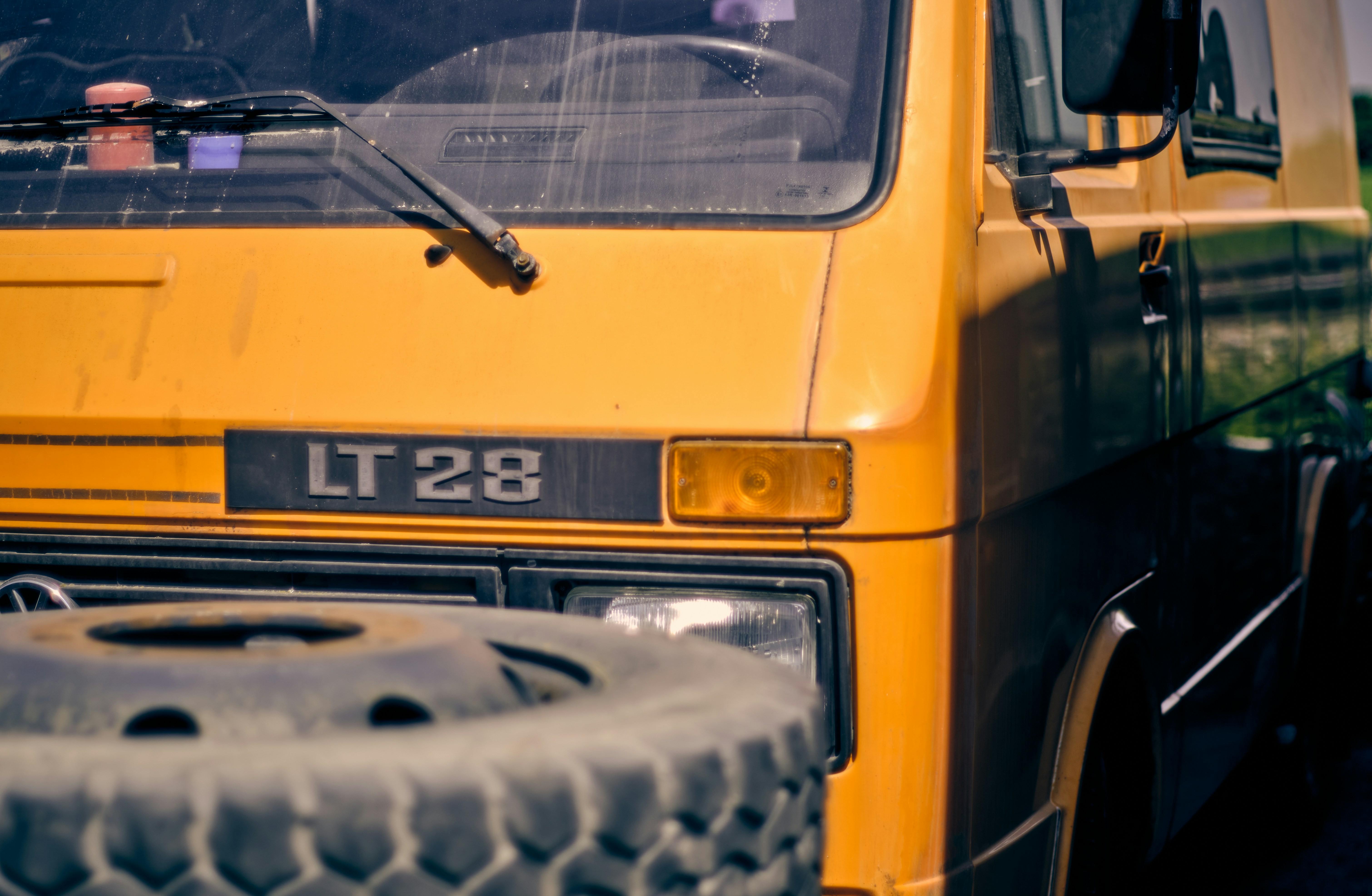 yellow and blue auto rickshaw