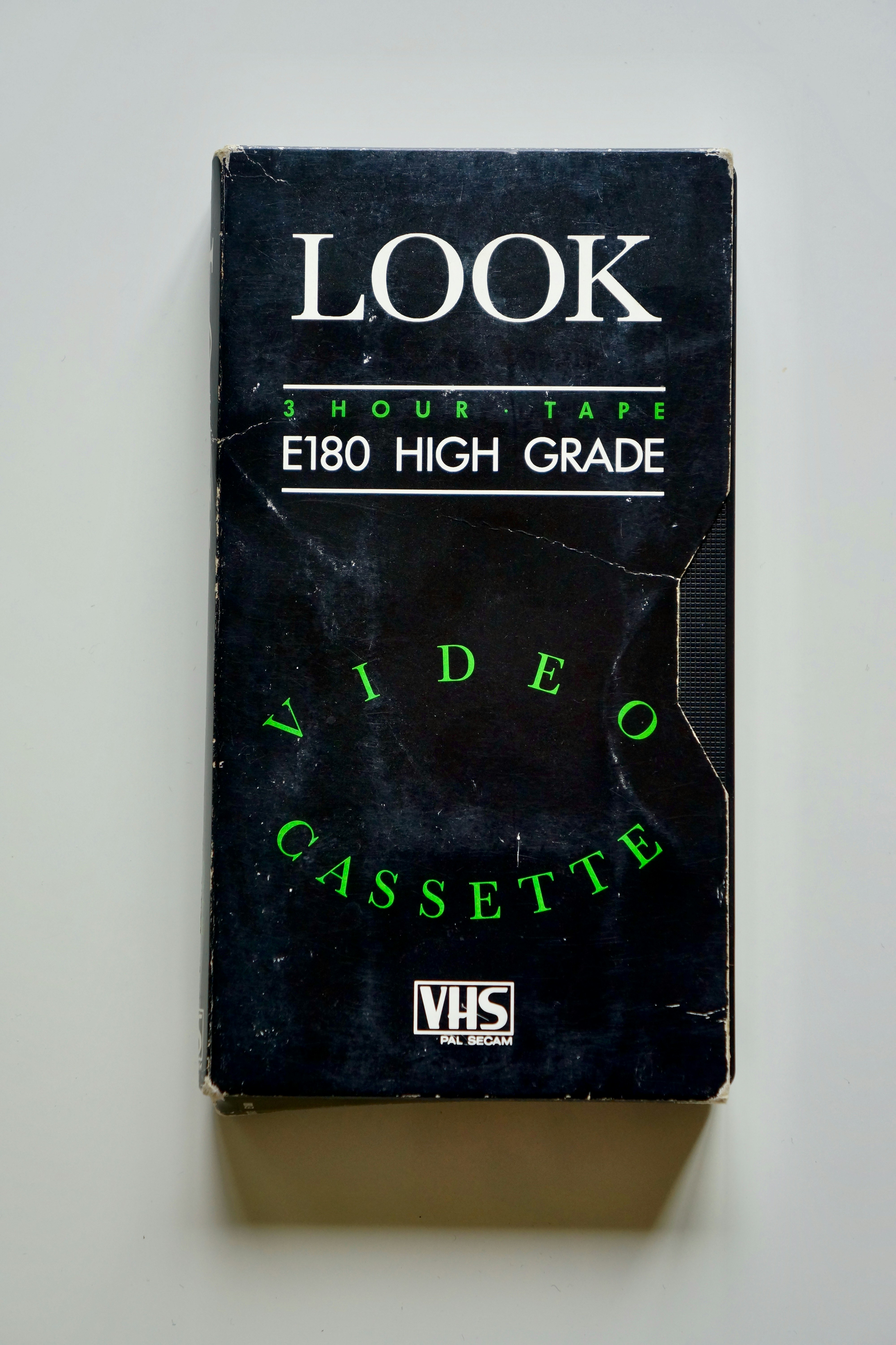 A black box with green writing on it photo – Free Retro Image on Unsplash