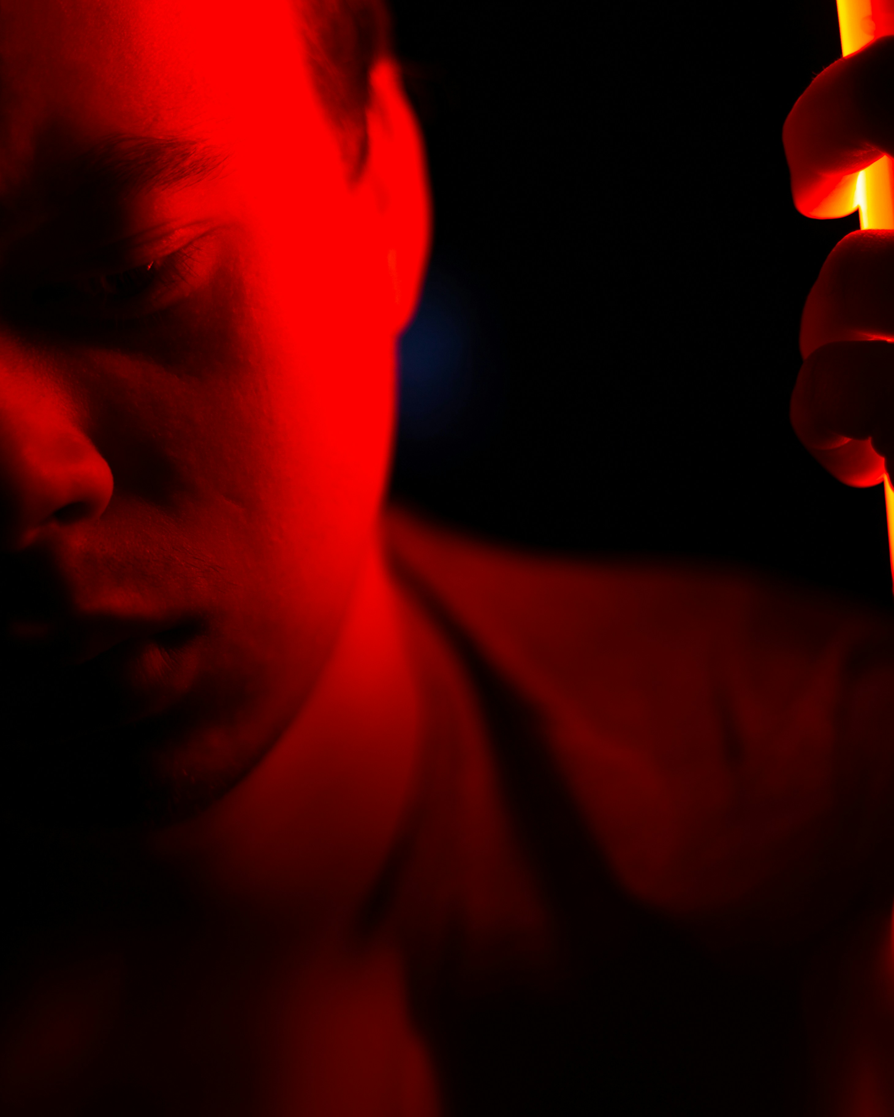 Crimson Sliver: A Quiet Moment with Neon Edge