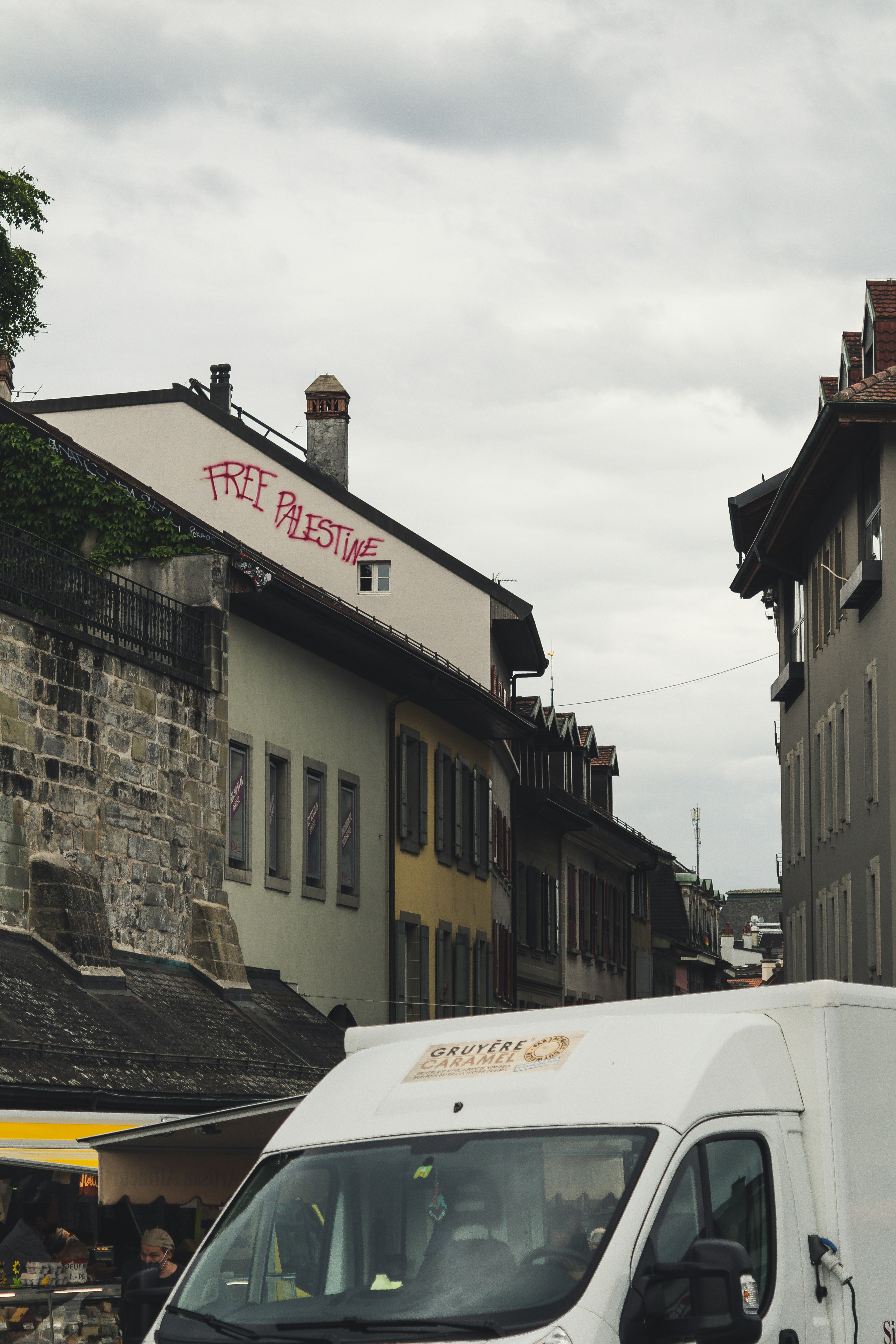 Graffiti Banner over Old Town Facade