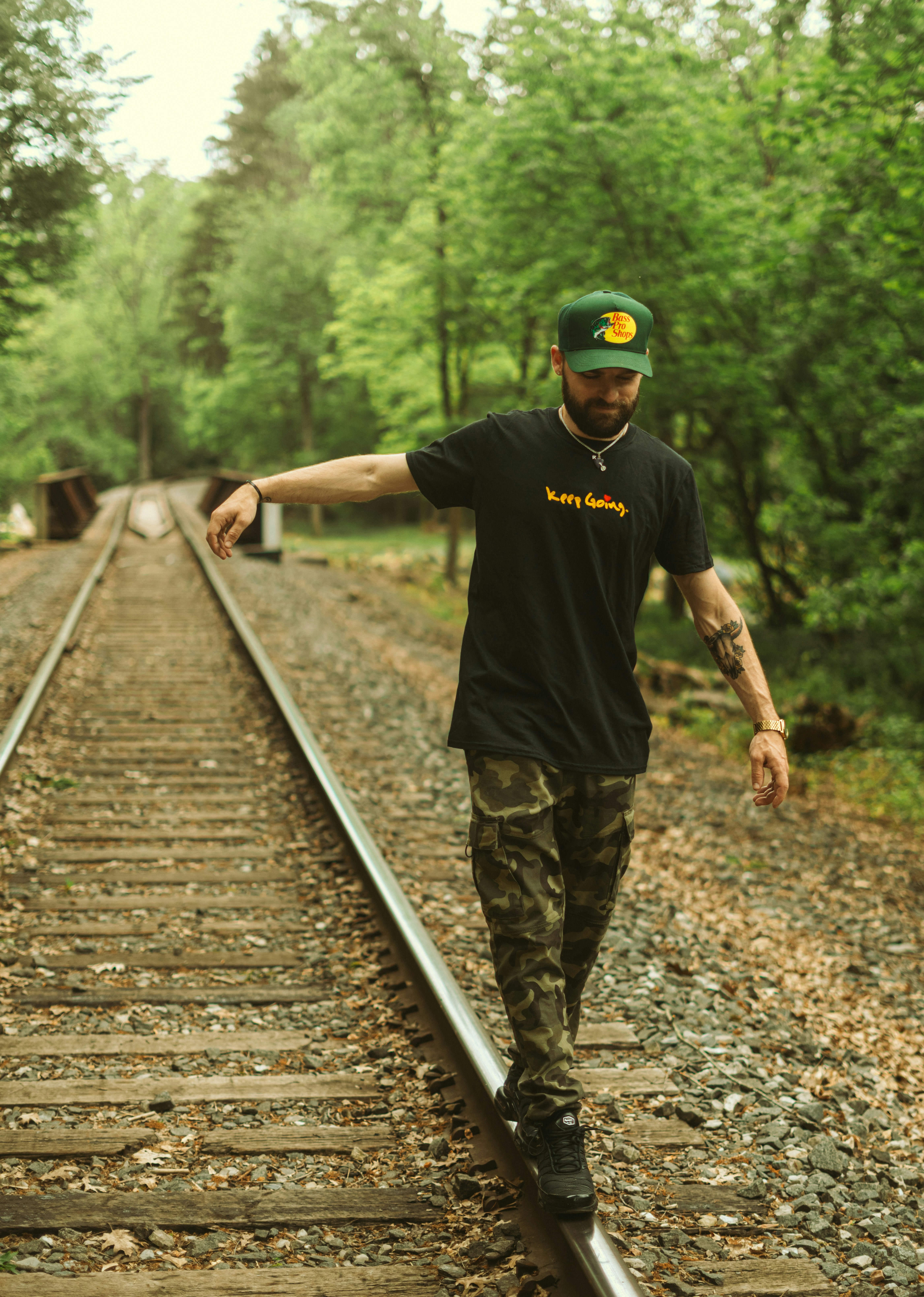 Balance on Rails: A Solo Moment in the Green Corridor