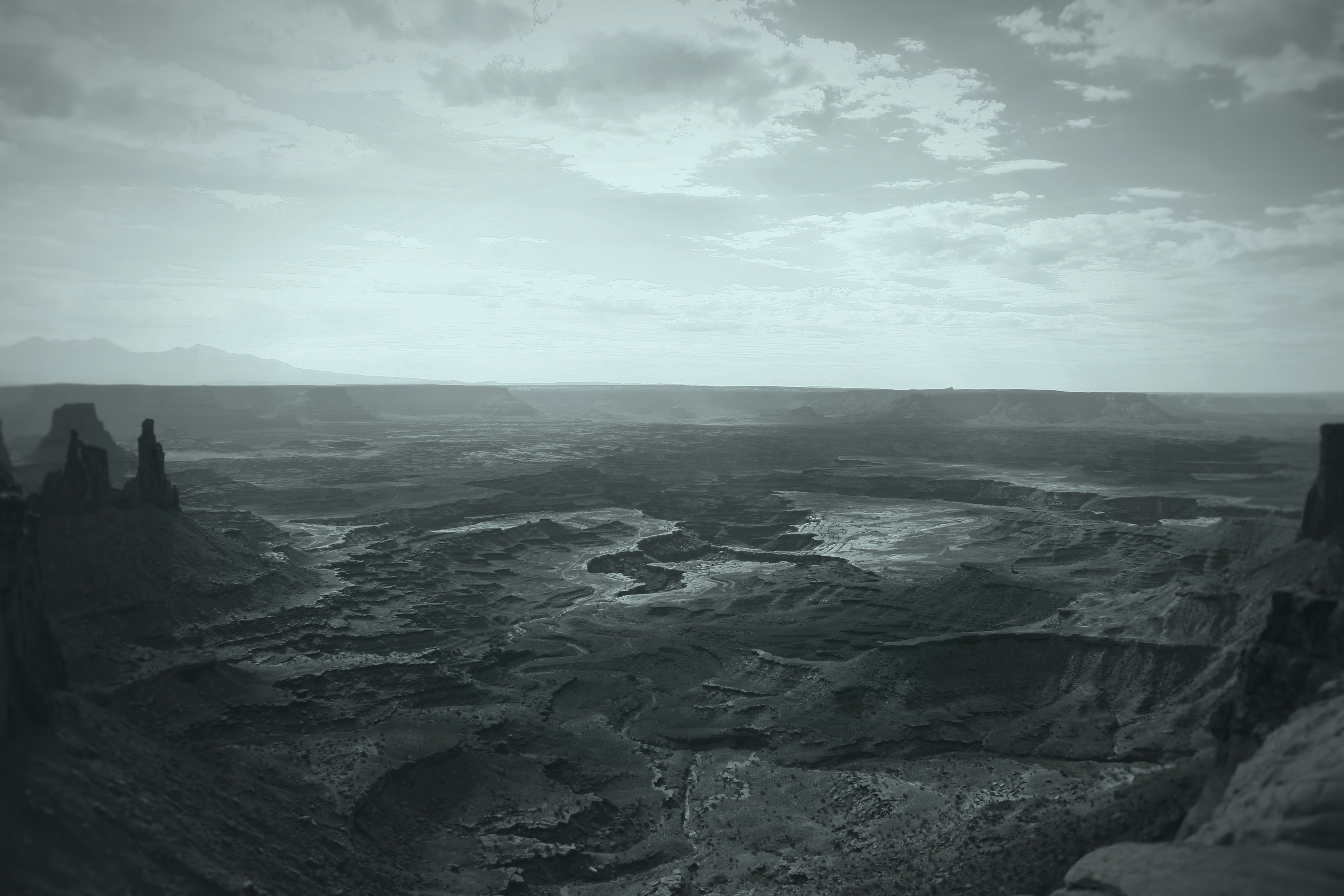 Echoes of Erosion: Monochrome Desert Canyon at Dusk