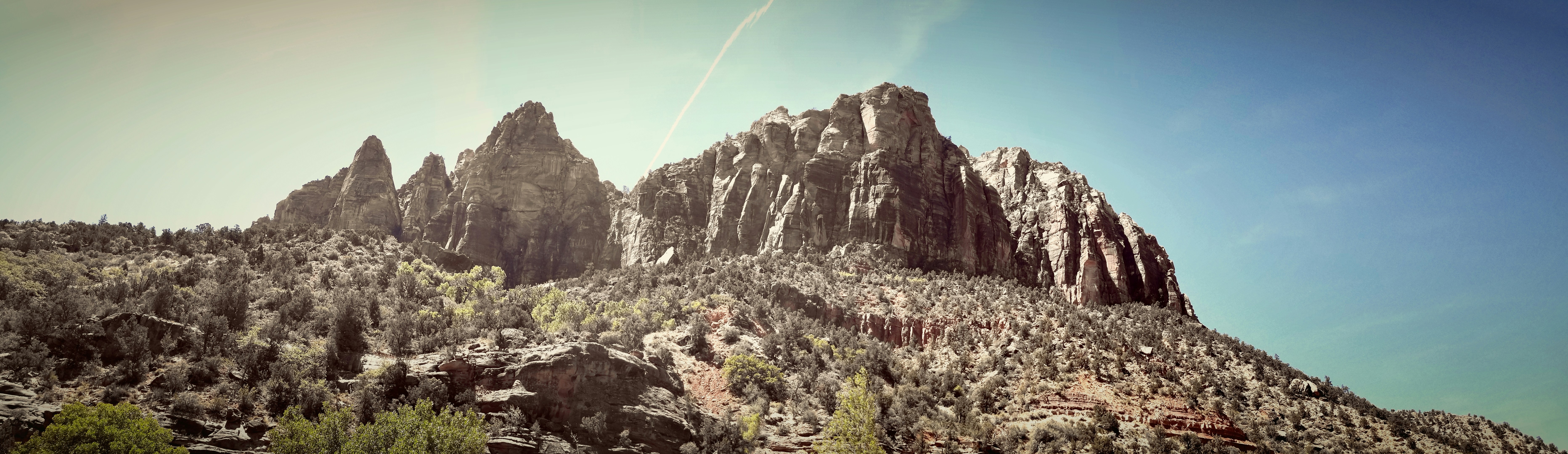 Granite Giants at Distant Horizon: A Panoramic Desert Ridge