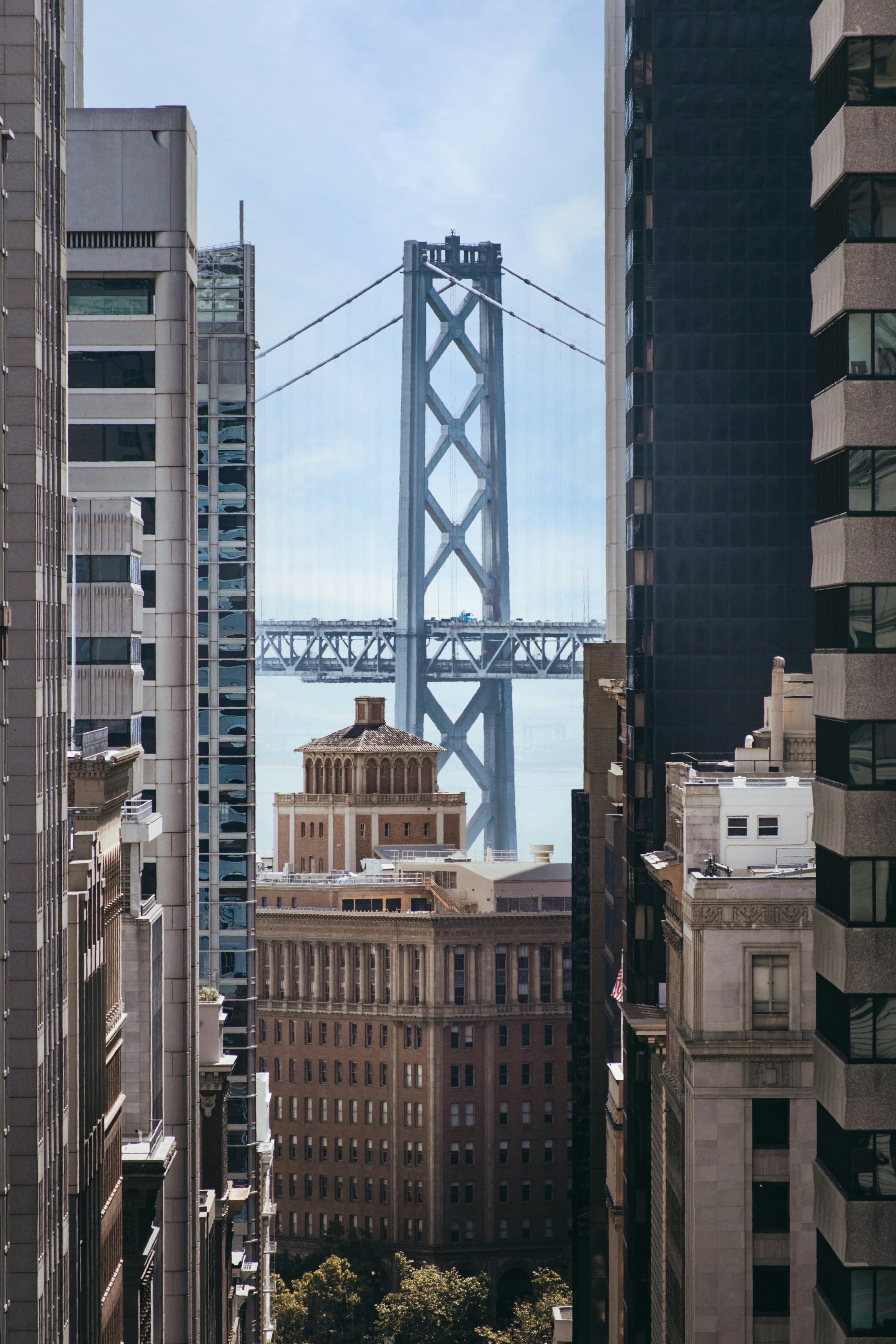 Between Steel Giants: Bay Bridge Framed by Downtown Towers