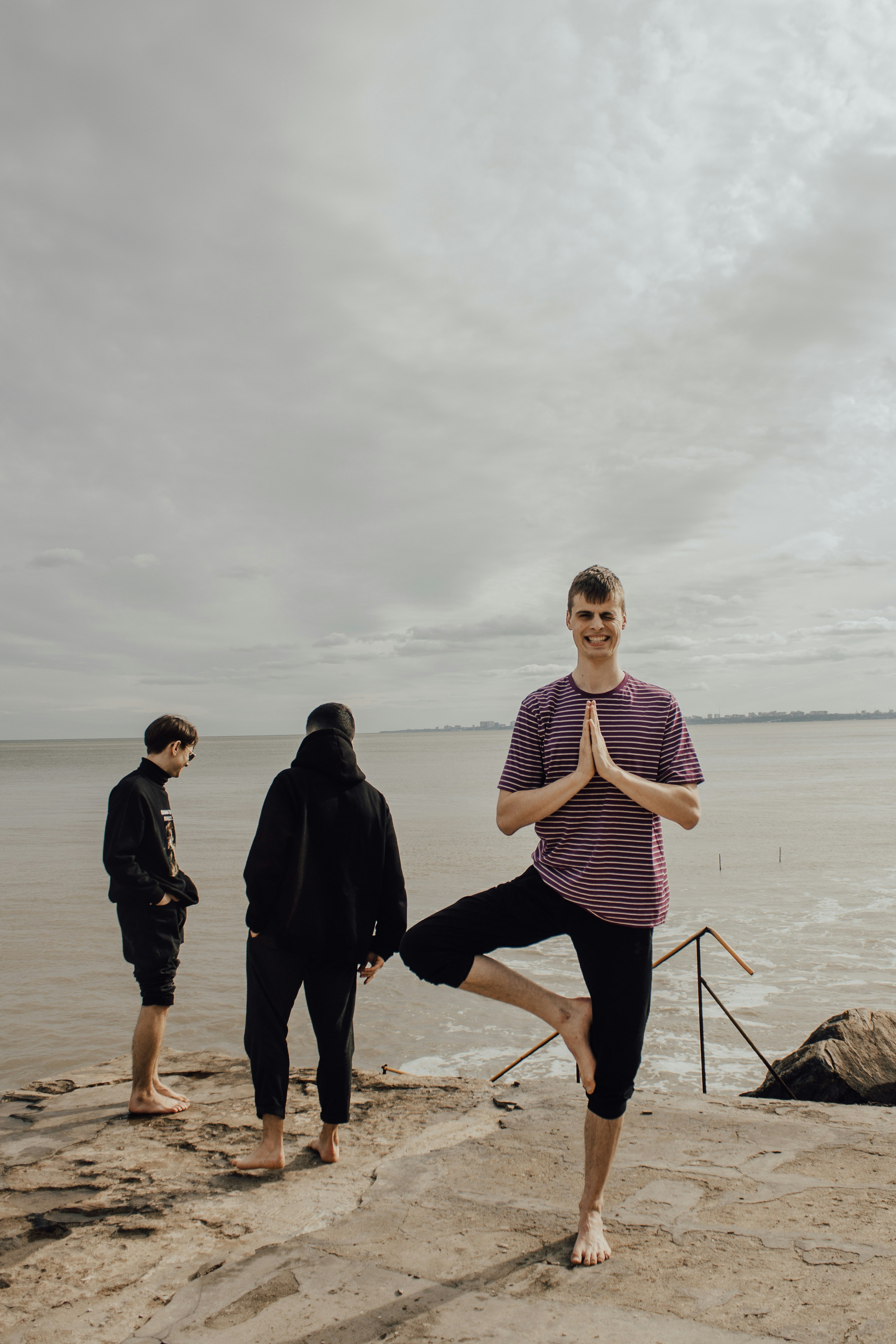 Balance on the Edge: a Seaside Moment with Friends