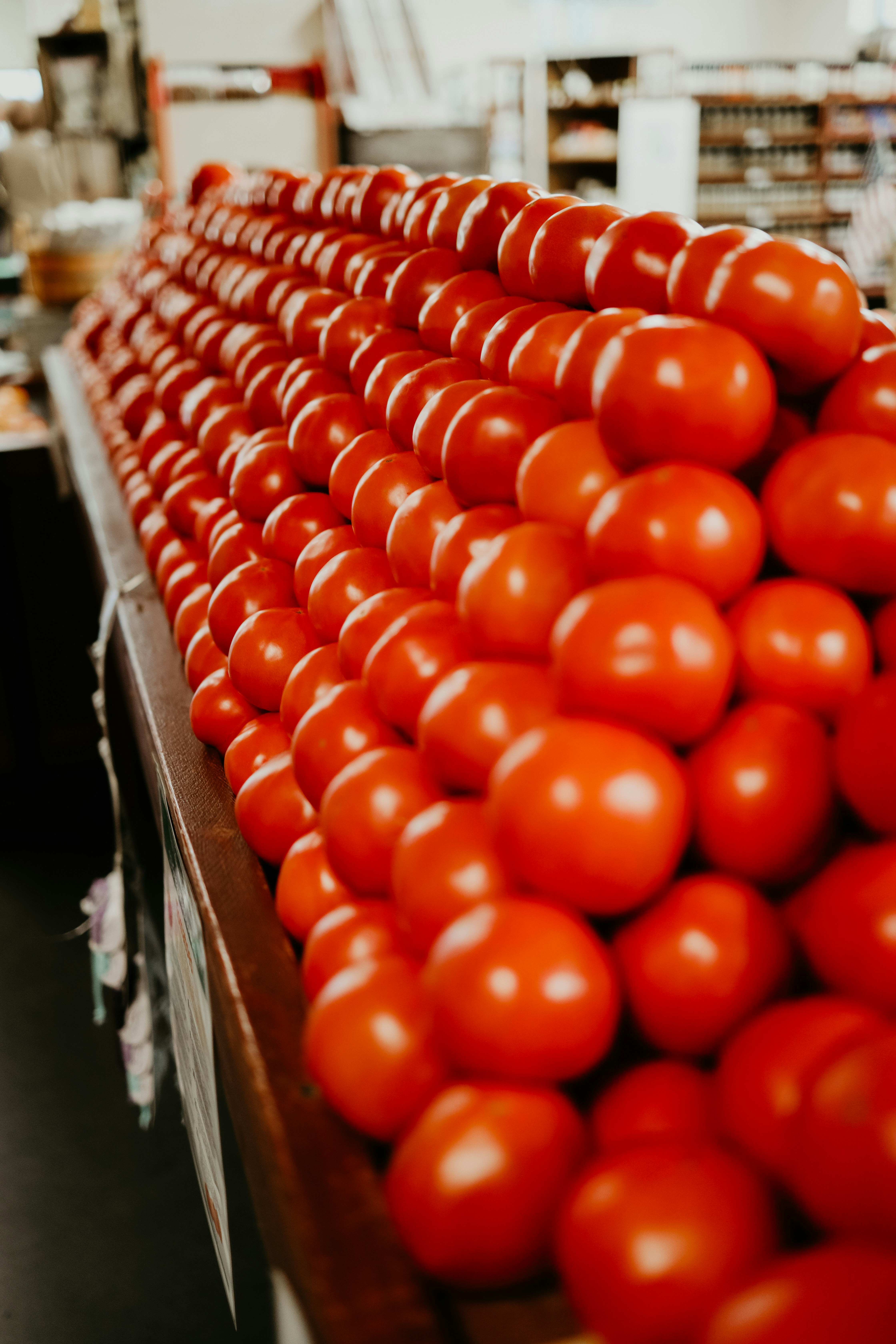 Crimson Cascade Along a Market Shelf