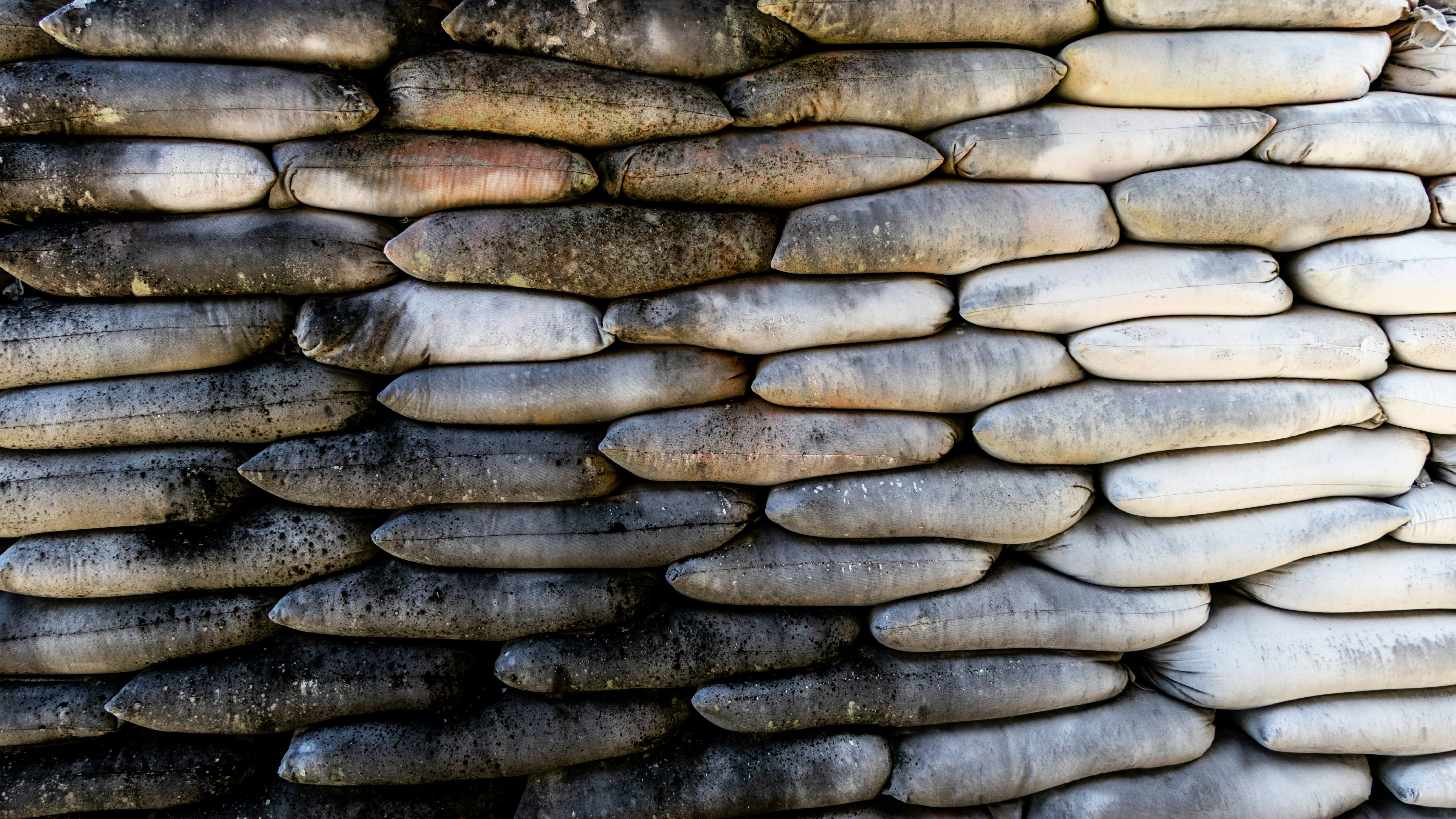 Pebble Ribbon Wall: A Quiet Tidal Stack of Weathered Stones