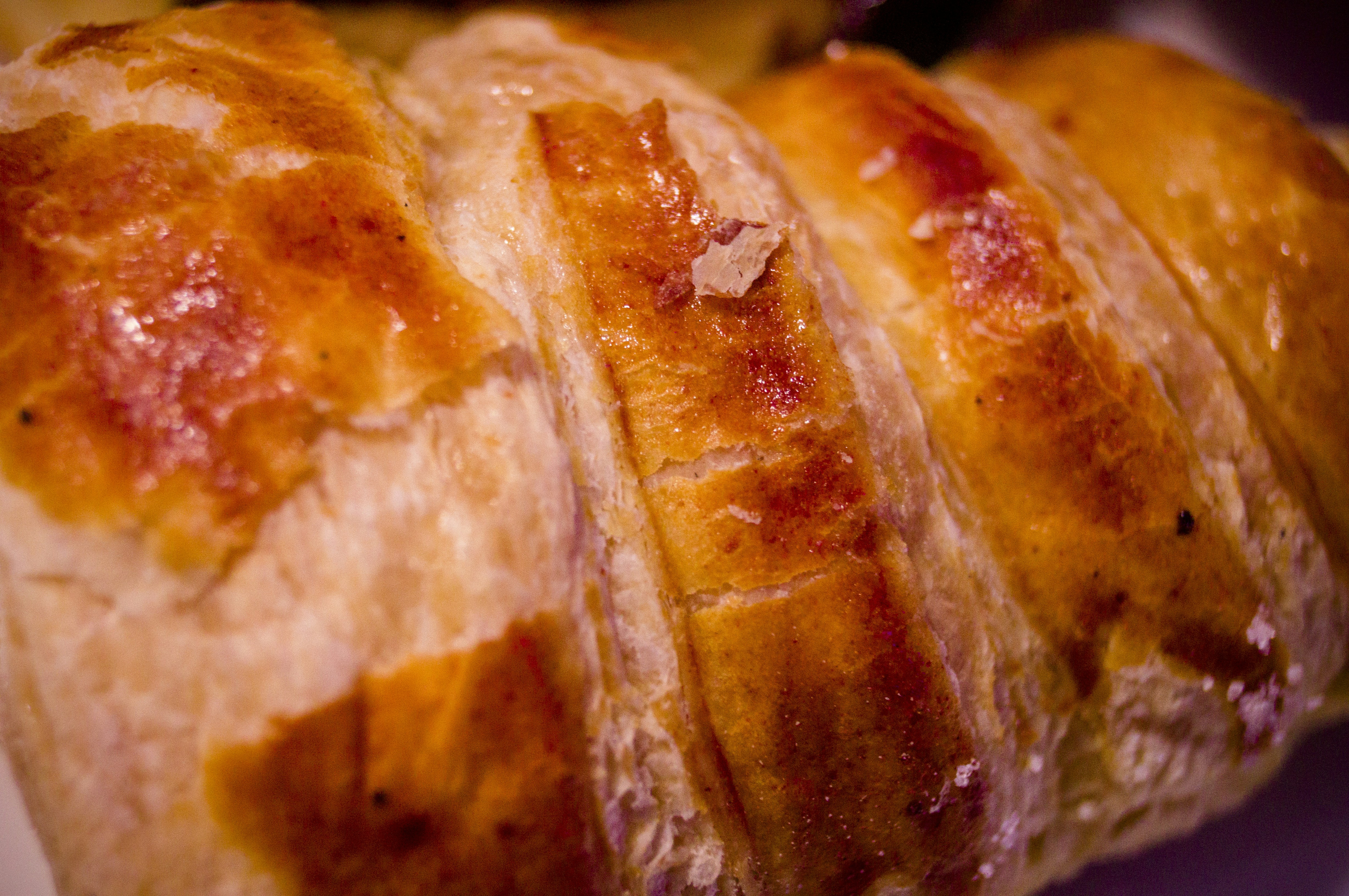 Macro Portrait: The Sunlit Ridges of a Flaky Loaf