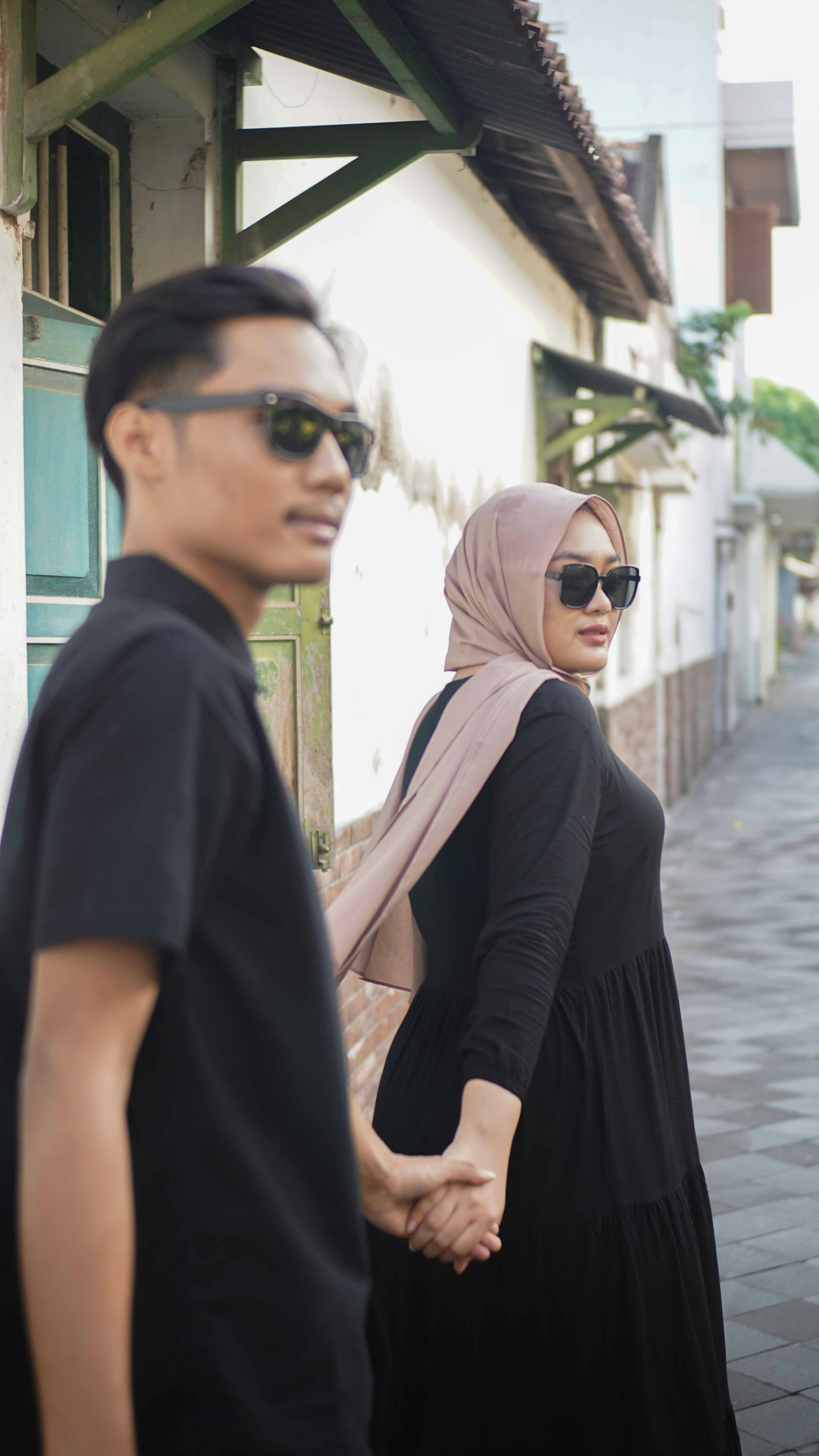 Linked in the Lane: A Subtle Portrait of a Couple in Soft Focus