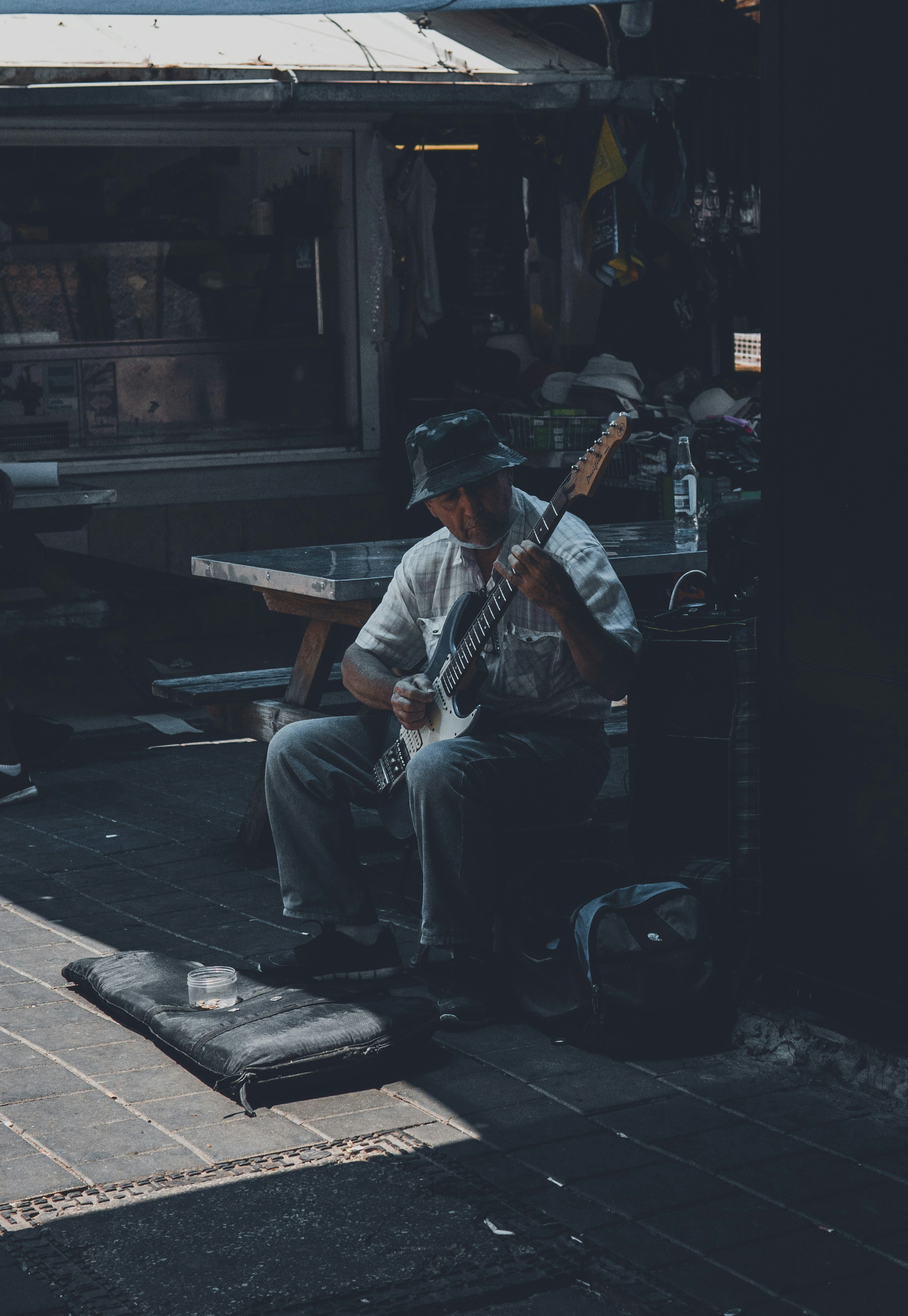 Strummed Echoes in a Quiet Street Corner