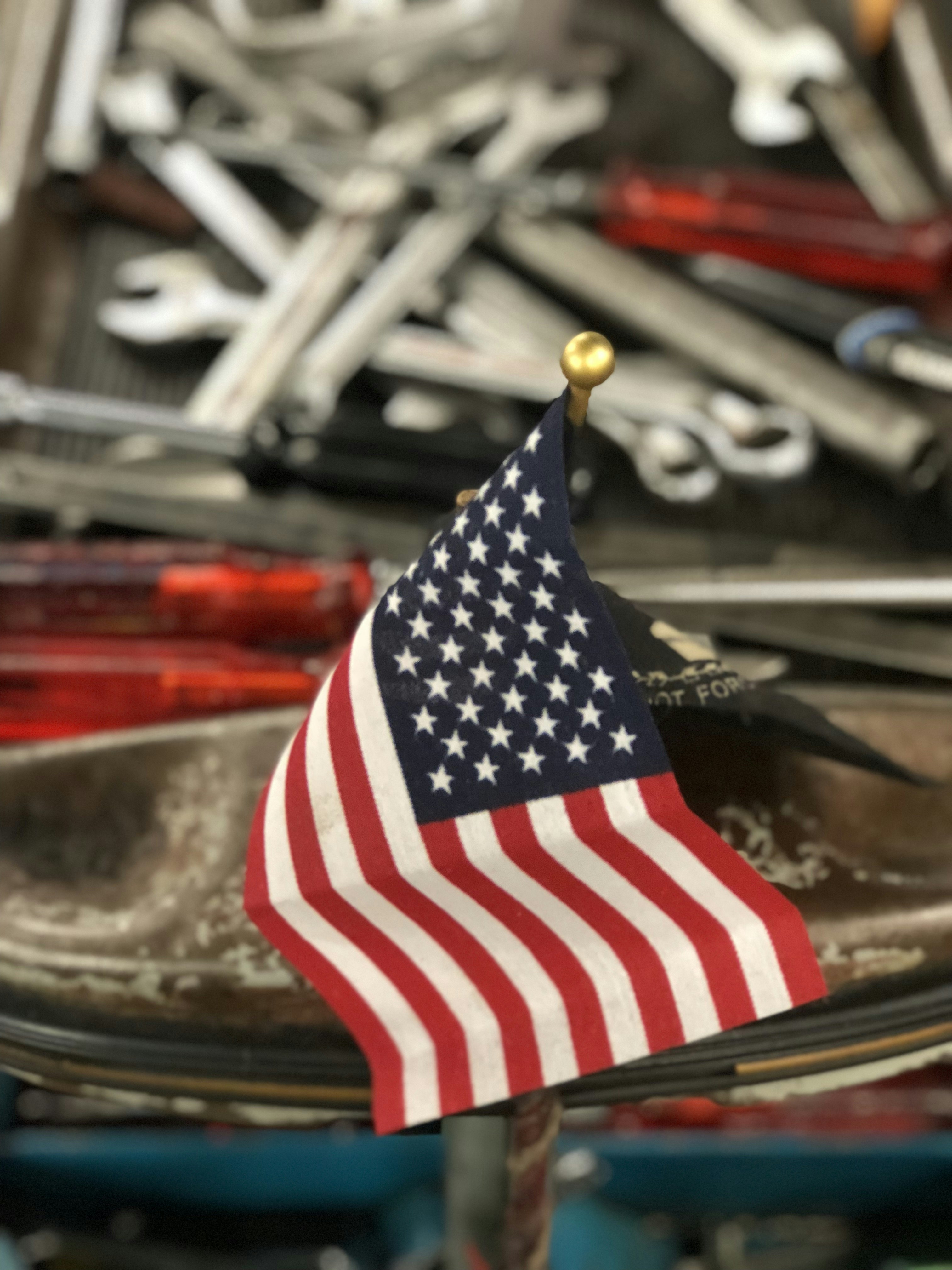 A Small American Flag Pin Defies the Workshop Chaos