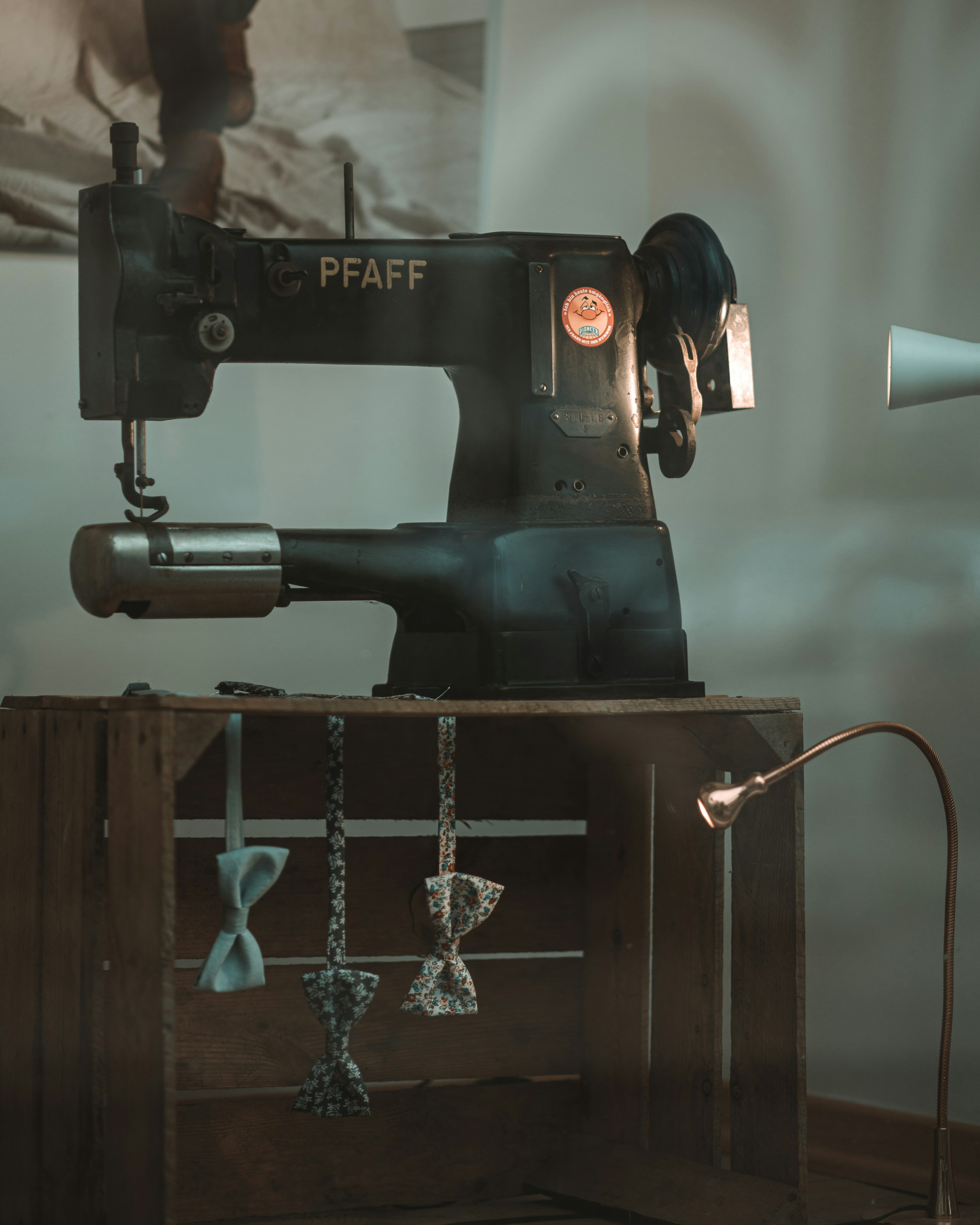 Pfaff in Quiet Atelier: A Vintage Stitchery Amid Hanging Charms