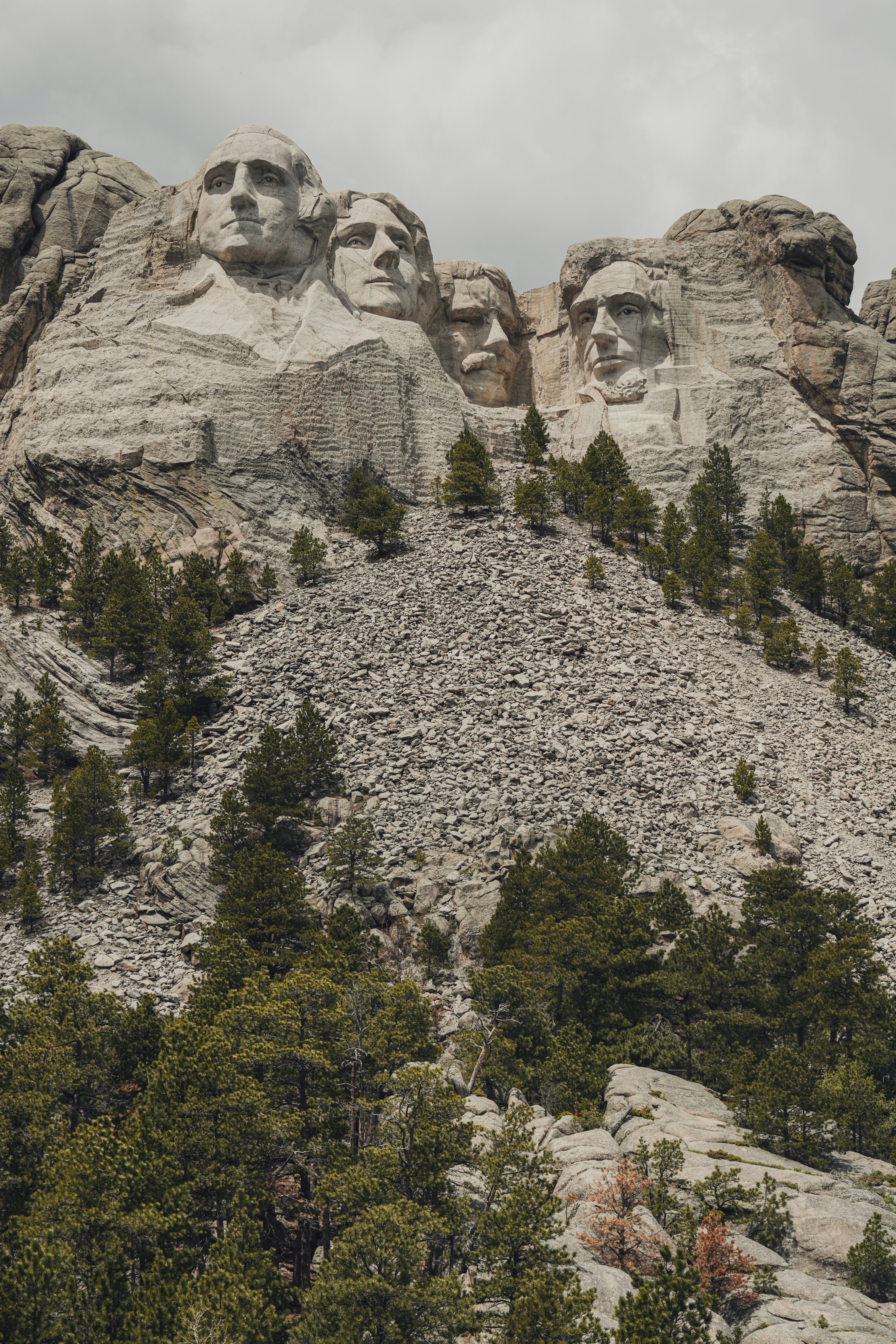 A group of mountains with trees on each side photo – Free Mount ...